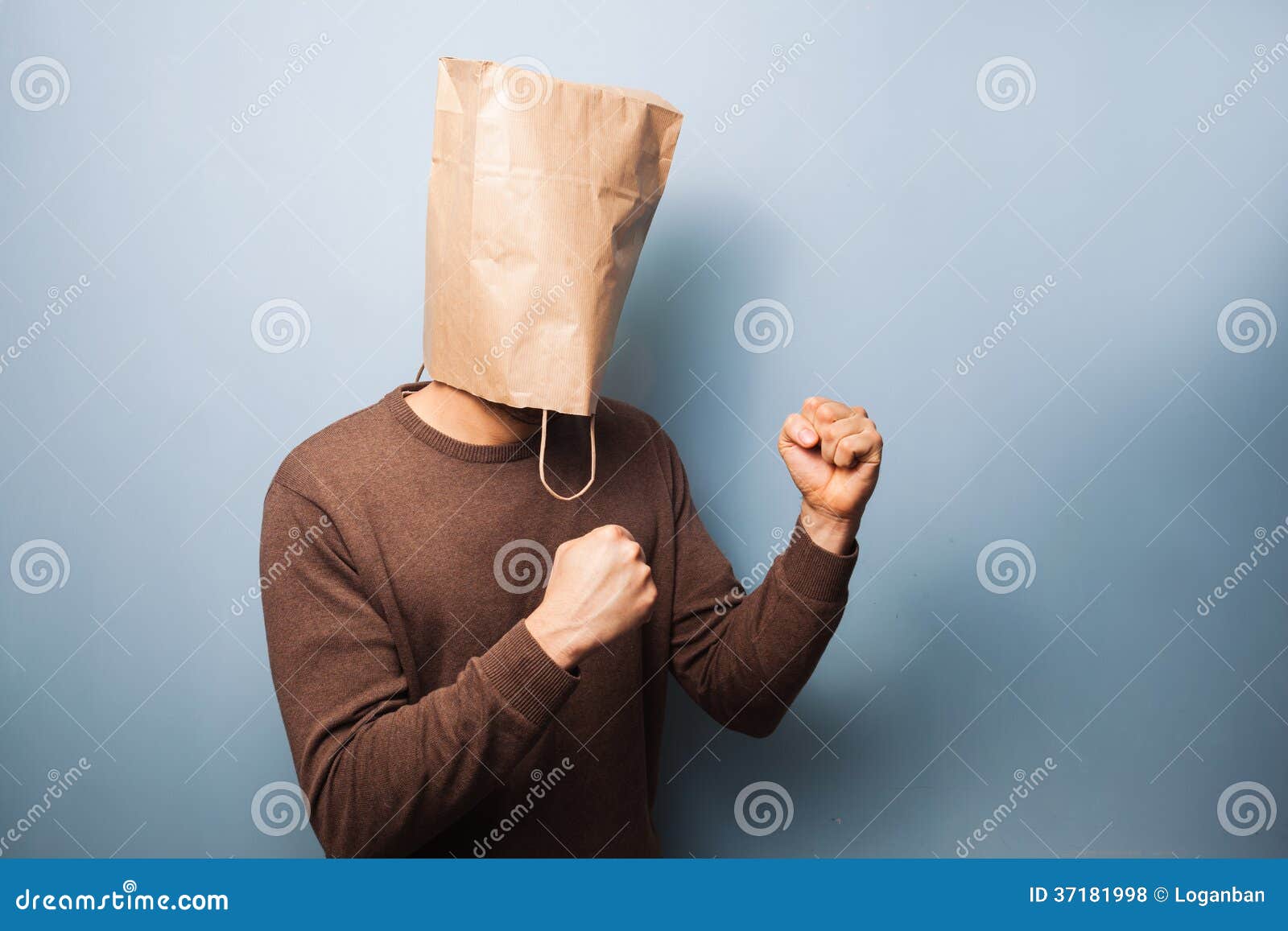 Young Man with Bag Over His Head in Fighting Stance Stock Photo - Image ...