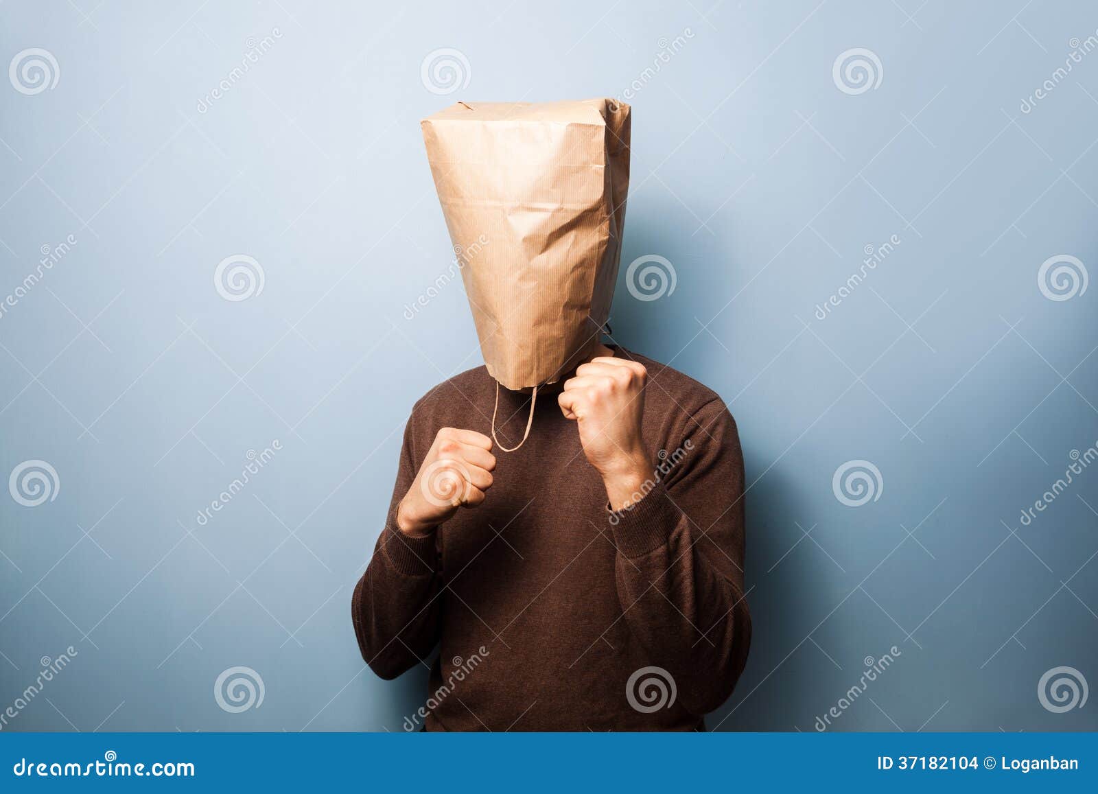 Young Man with Bag Over His Head in Fighting Stance Stock Photo - Image ...