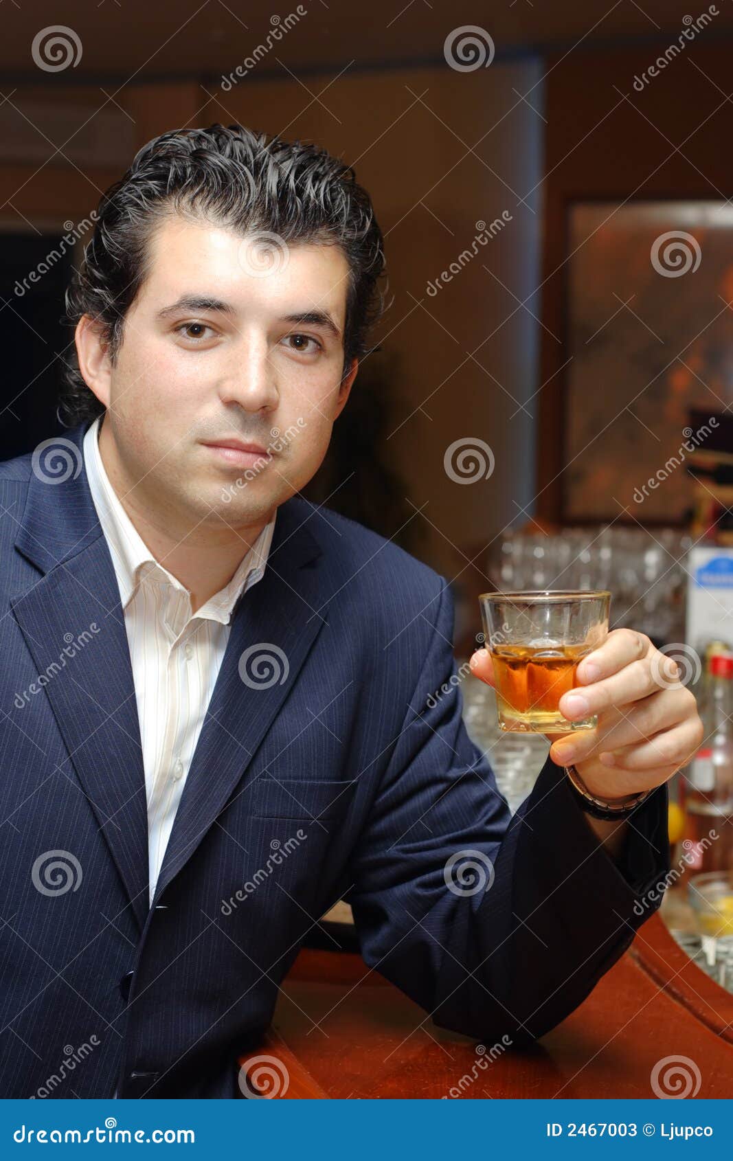 Young man in a bar stock image. Image of nightclub, drink - 2467003
