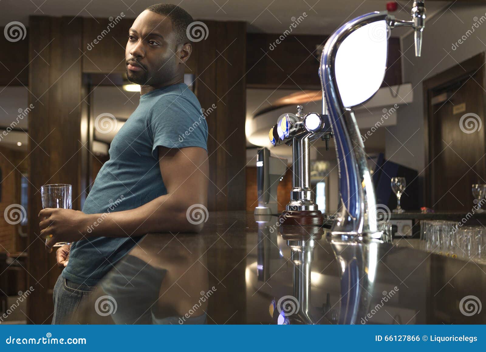 Young man at the bar stock photo. Image of waiting, bevarage - 66127866