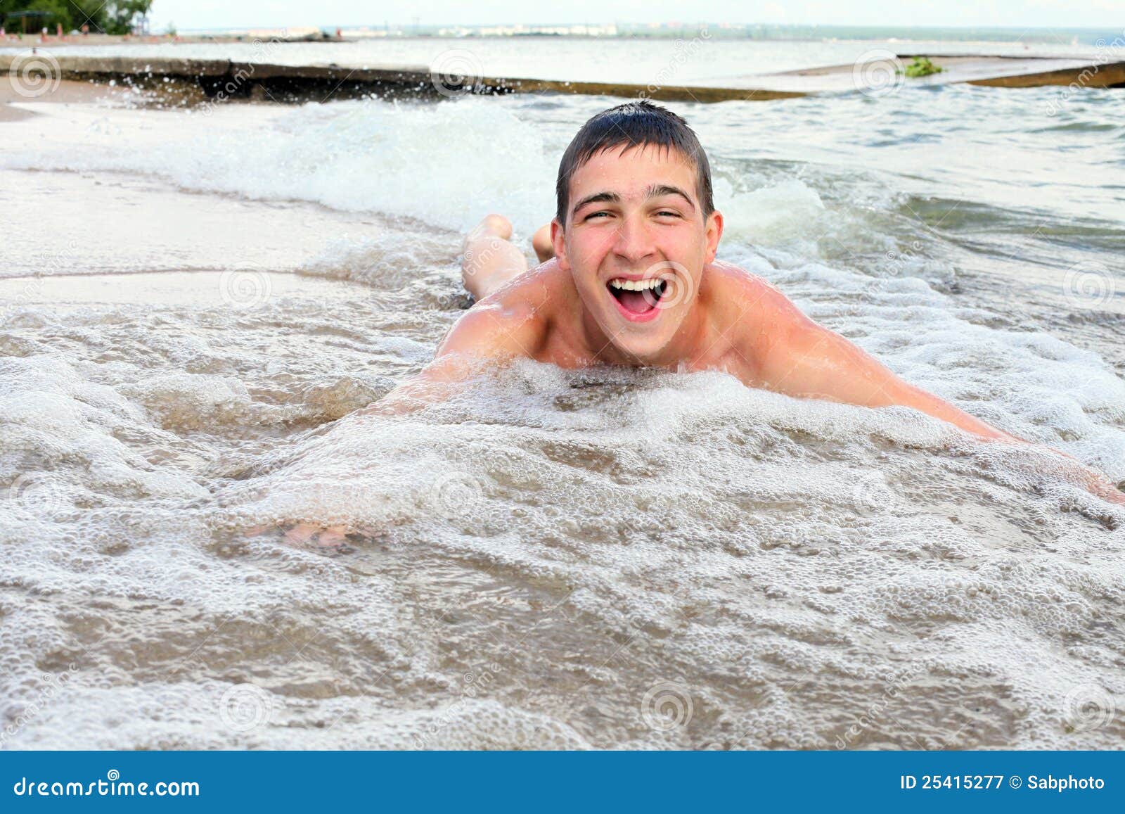 Young man bathing stock image. Image of playful, splash - 25415277