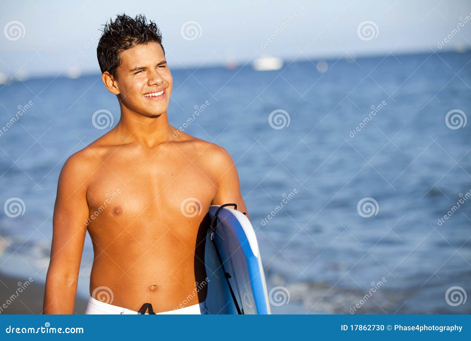 Young man beach stock photo. Image of surf, boogie, beach - 17862730