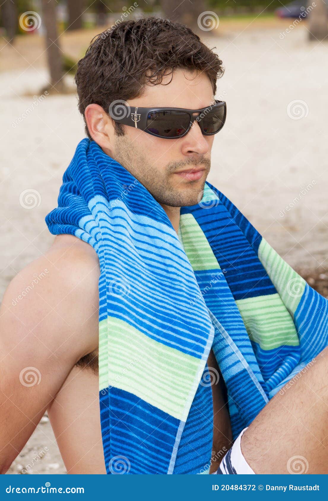 Young man on the beach stock photo. Image of athlete - 20484372