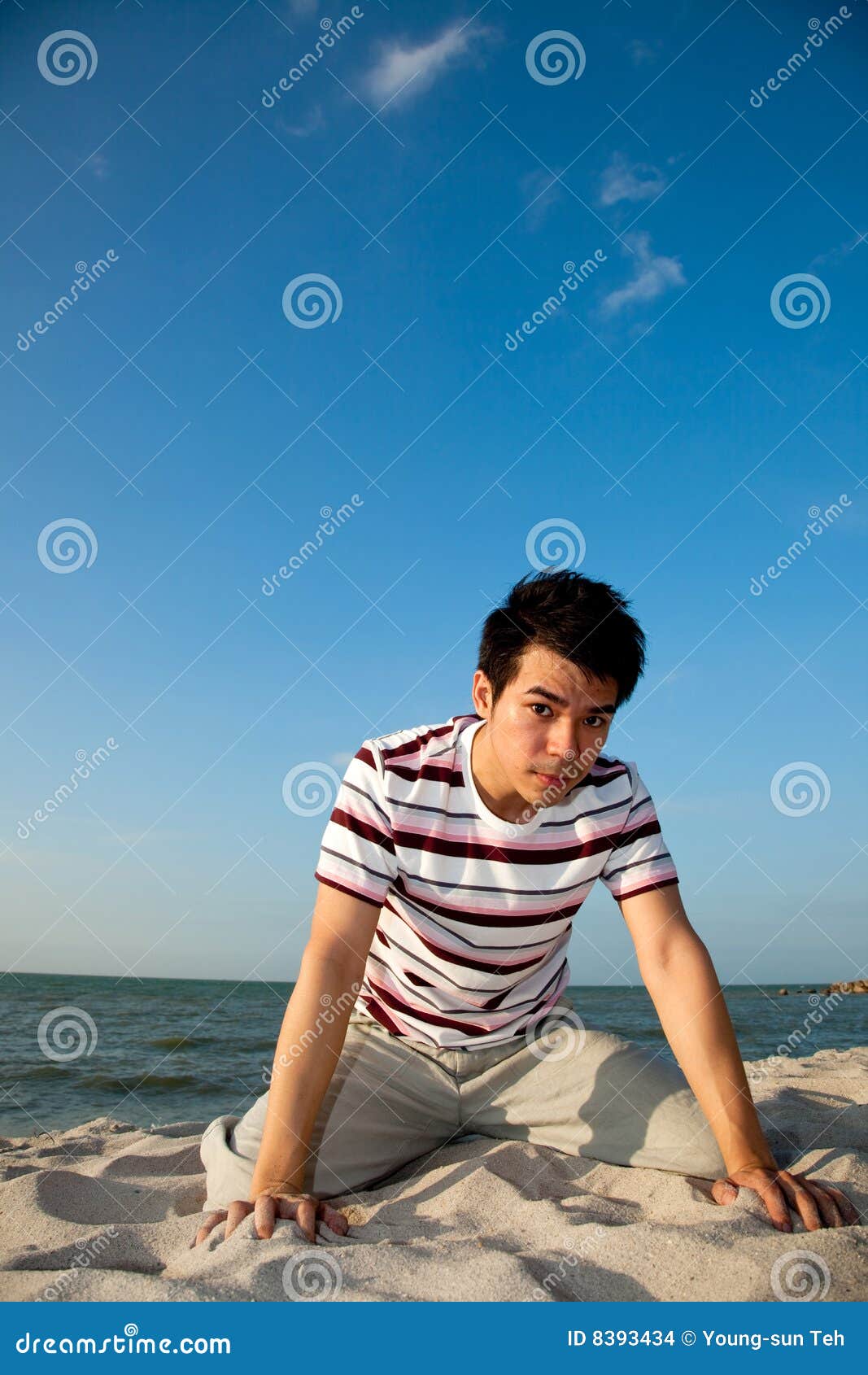Young man by the beach stock photo. Image of horizon, paradise - 8393434