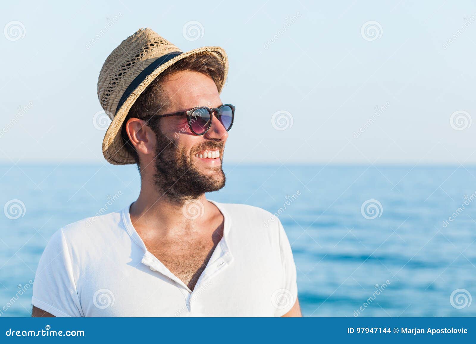 Young man on the beach stock photo. Image of beach, bearded - 97947144