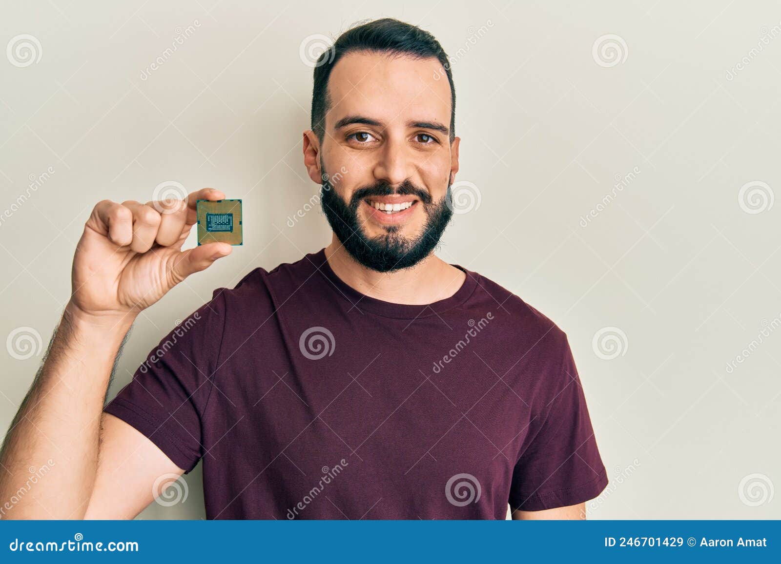 Young Man with Beard Holding Cpu Computer Processor Looking Positive ...