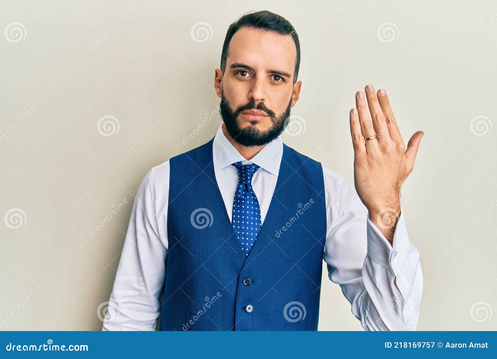 Young Man with Beard Wearing Engagement Ring Thinking Attitude and ...