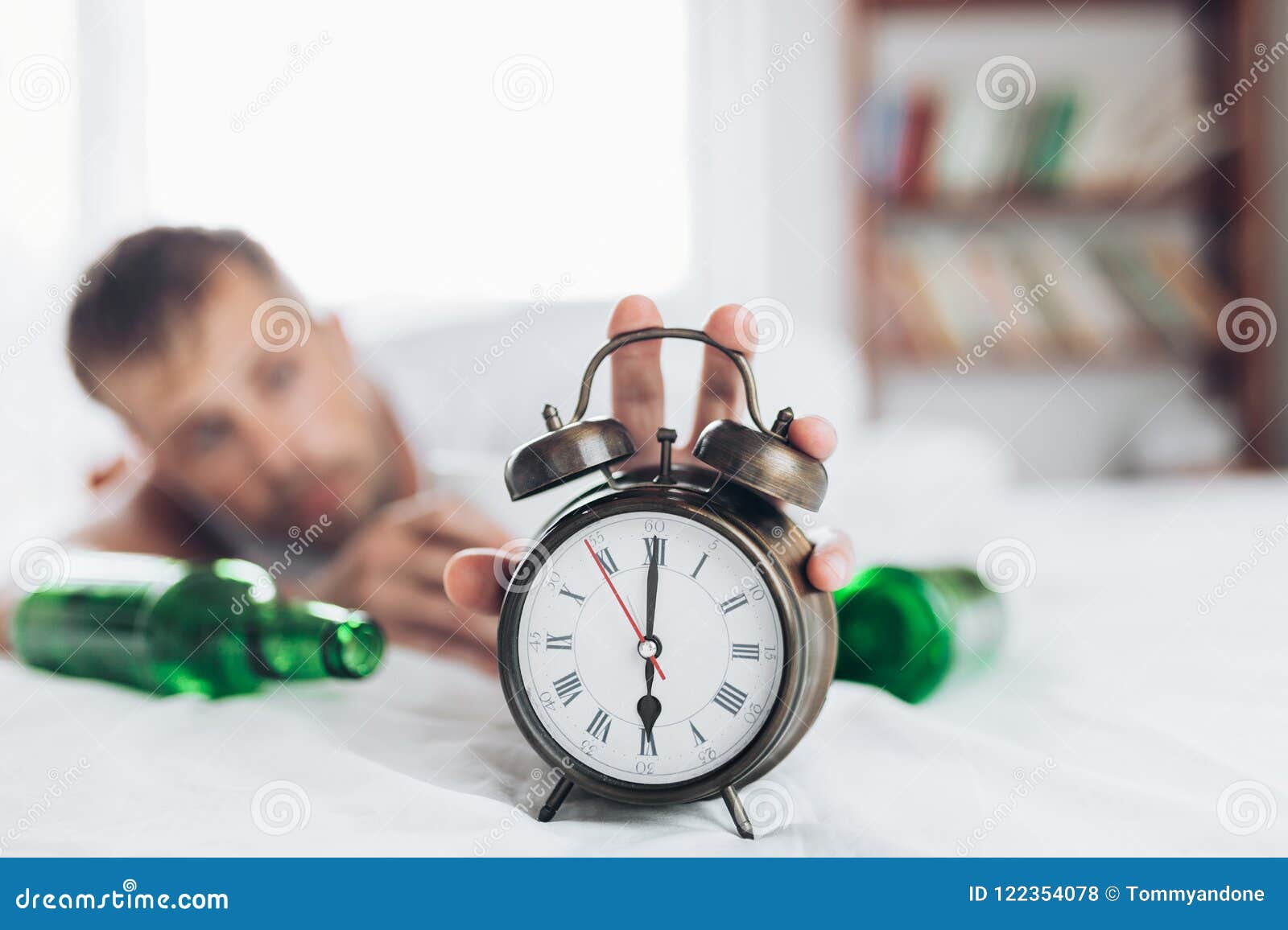 Young Man in Bed the Morning after Night Out Drinking Stock Photo ...