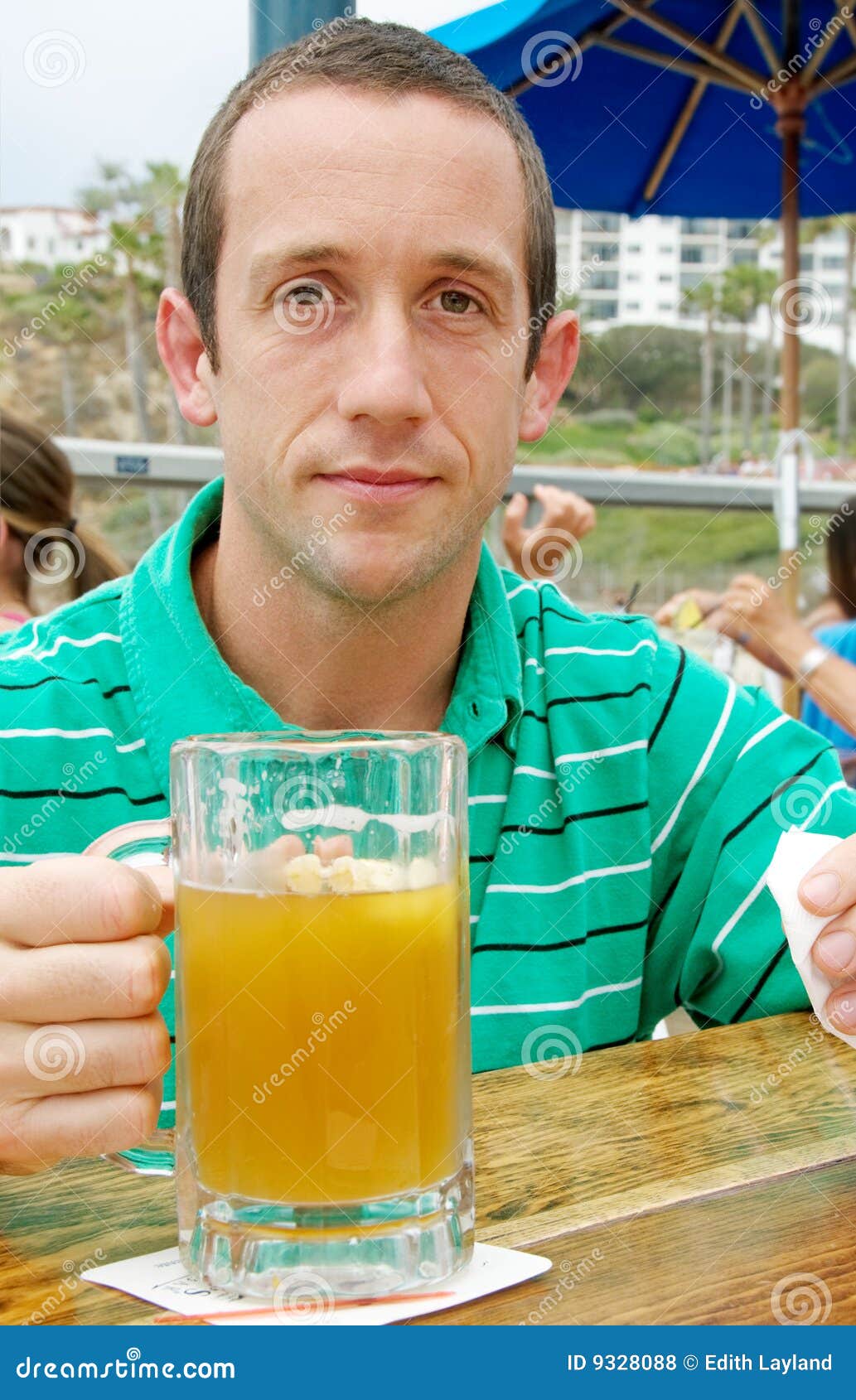 Young Man with Beer stock photo. Image of beachside, smiling - 9328088