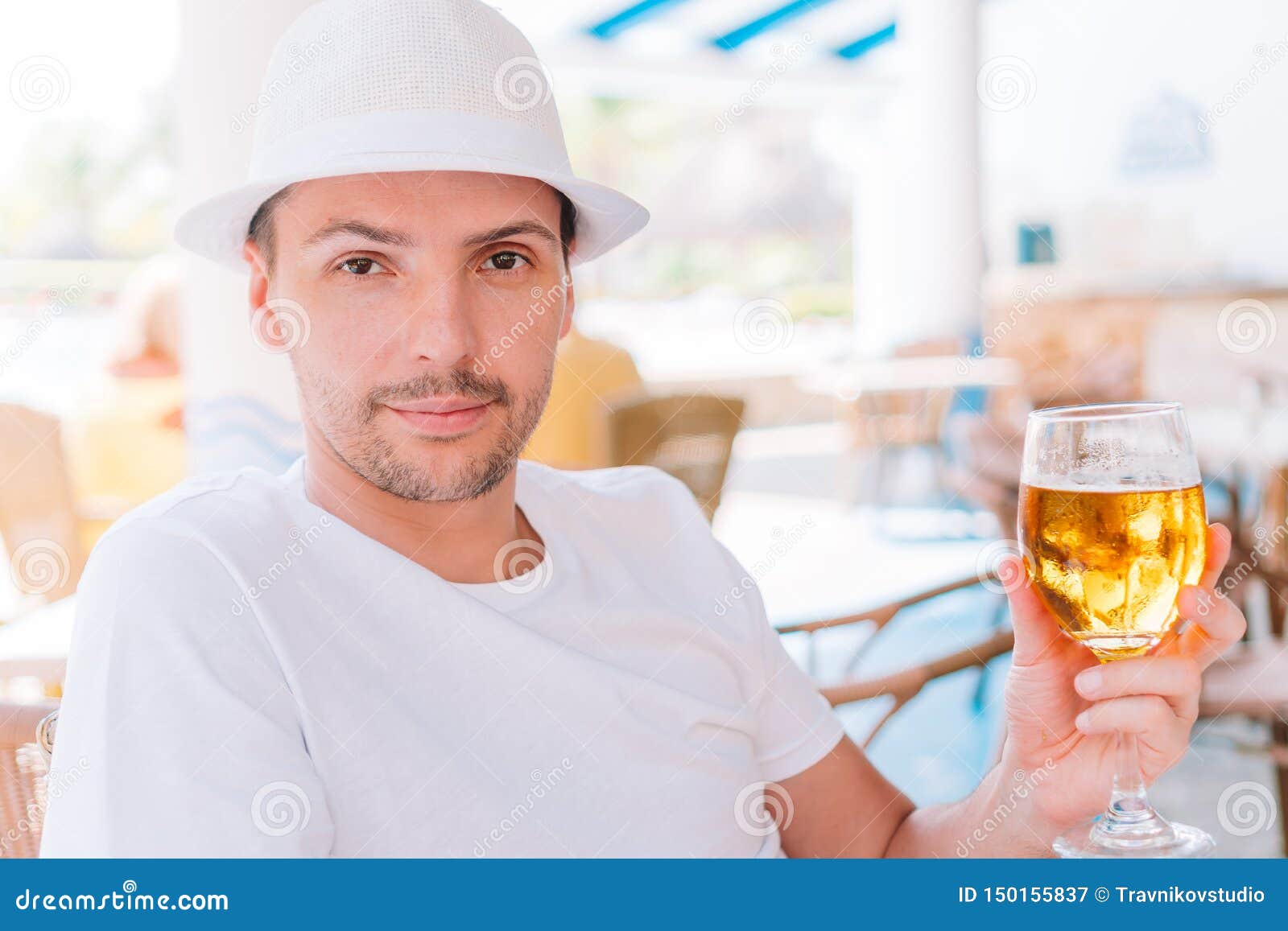 Young Man with Beer on the Beach in Outdoors Bar Stock Image - Image of ...