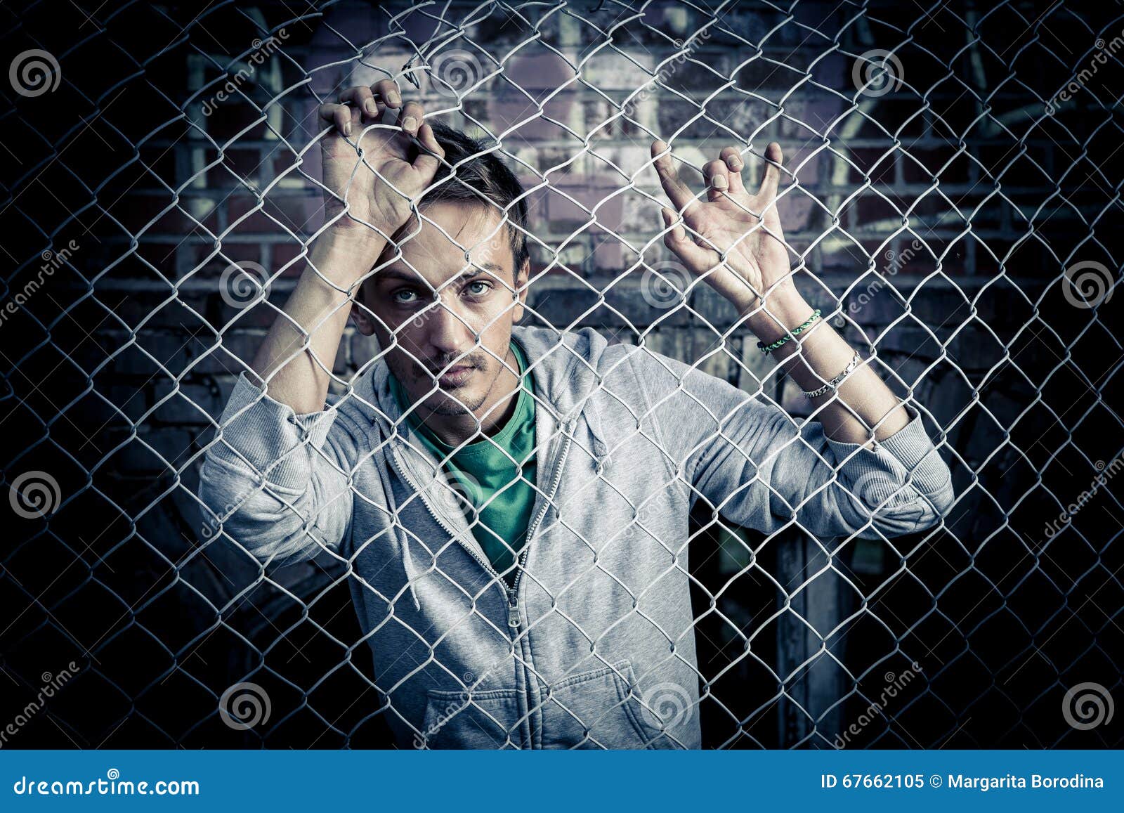 A Young Man Behind Bars Close Stock Image - Image of justice, freedom ...