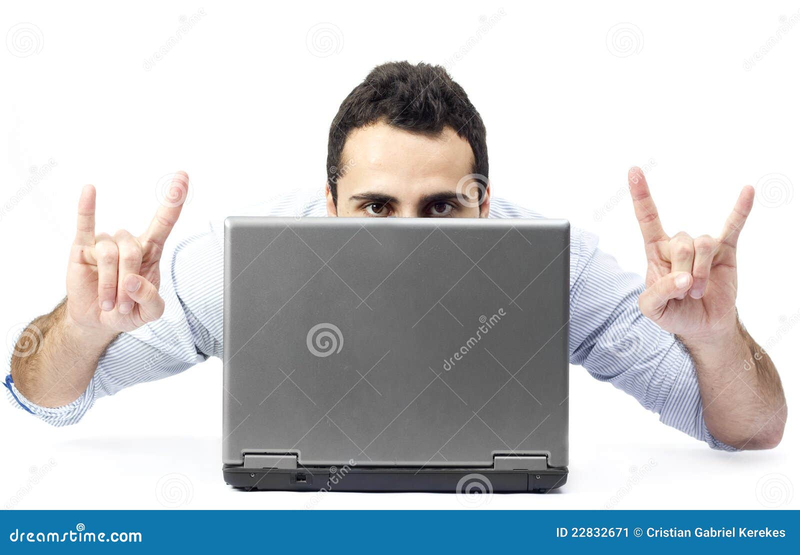 Young man behind a laptop stock image. Image of people - 22832671