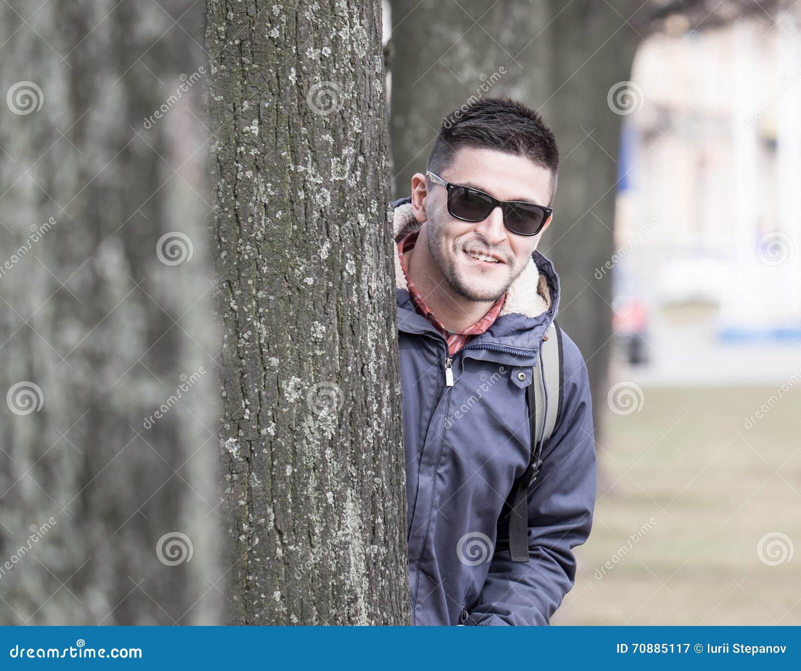 Young Man Behind Tree Stock Image Image Of Outdoors 70885117