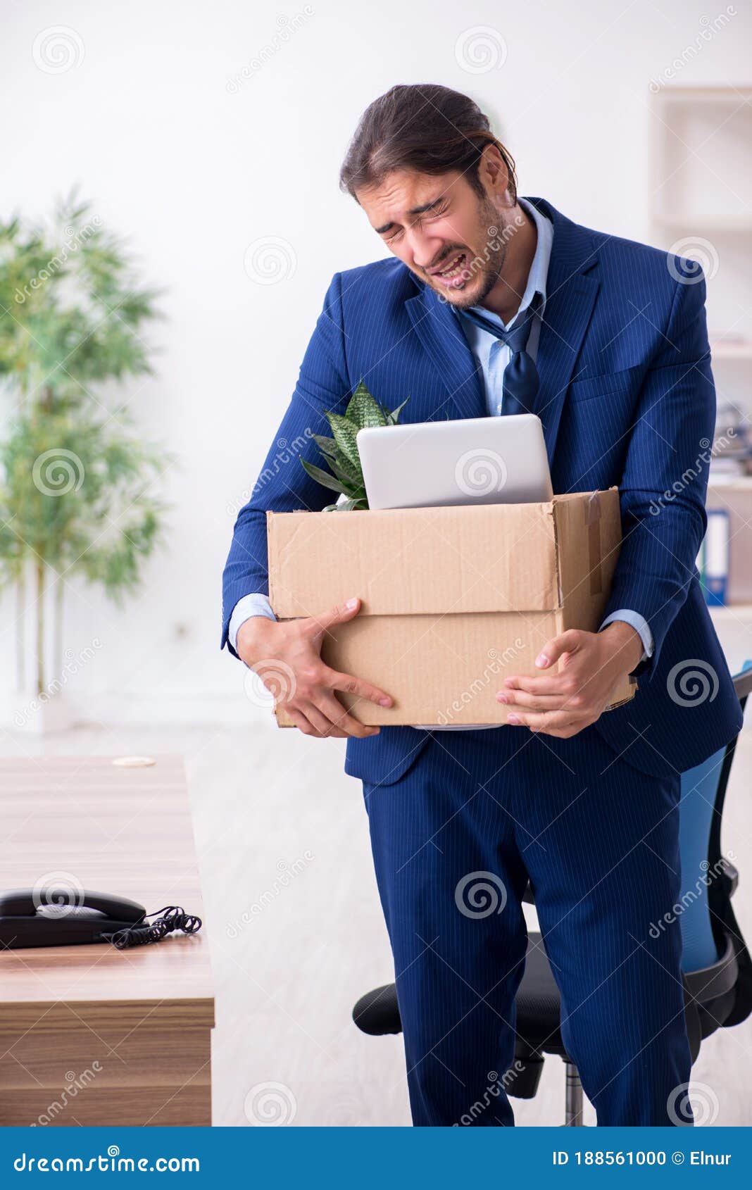 Young Man Being Fired from His Work Stock Photo - Image of belongings ...