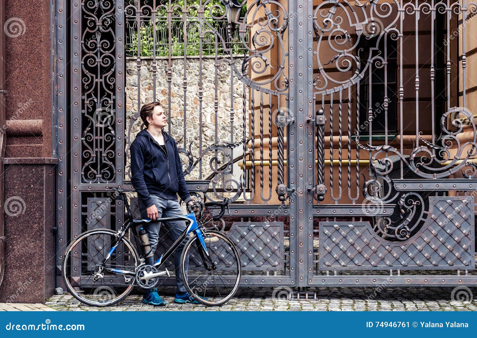 Young Man with a Bicycle Near the Gate Stock Image - Image of freedom ...
