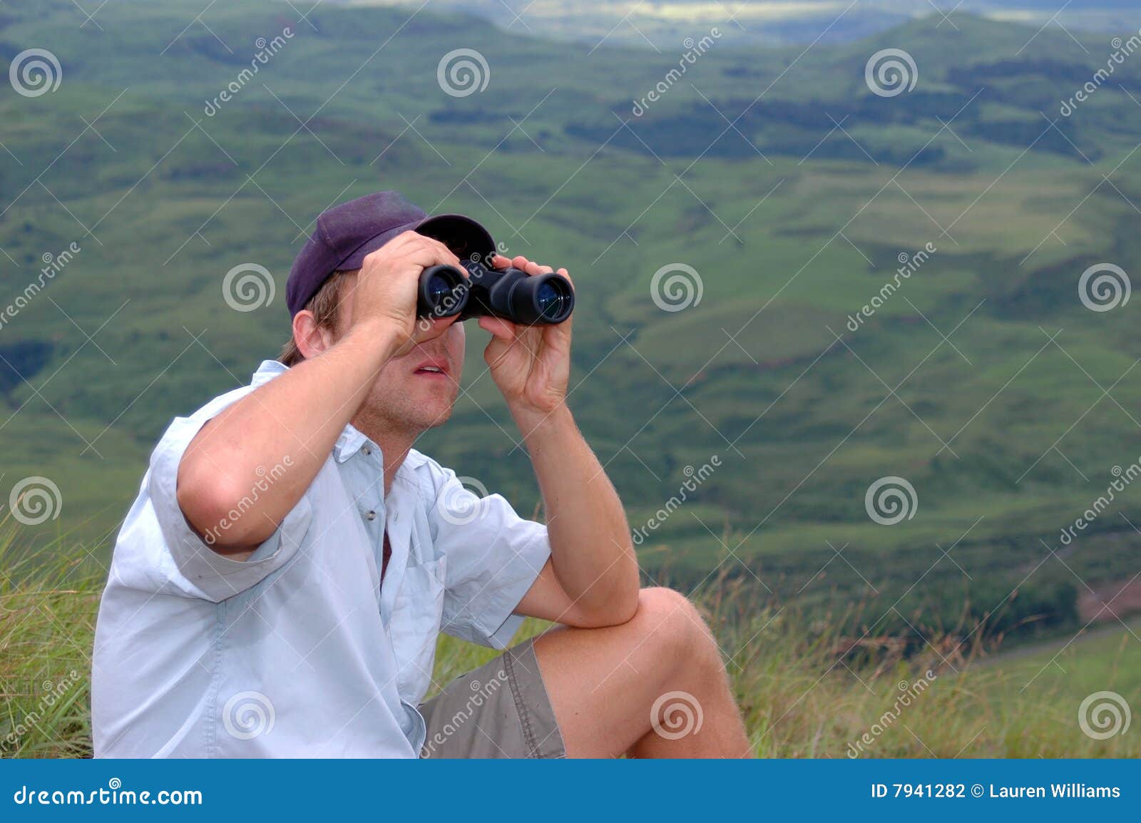 Young man with binoculars stock photo. Image of stubble - 7941282