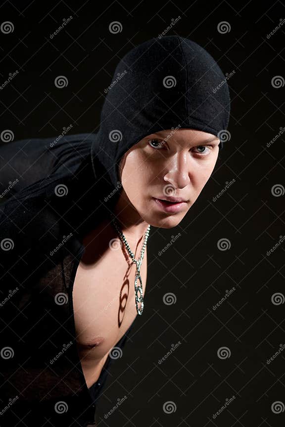 Young man in black cloack stock image. Image of emotion - 12063623