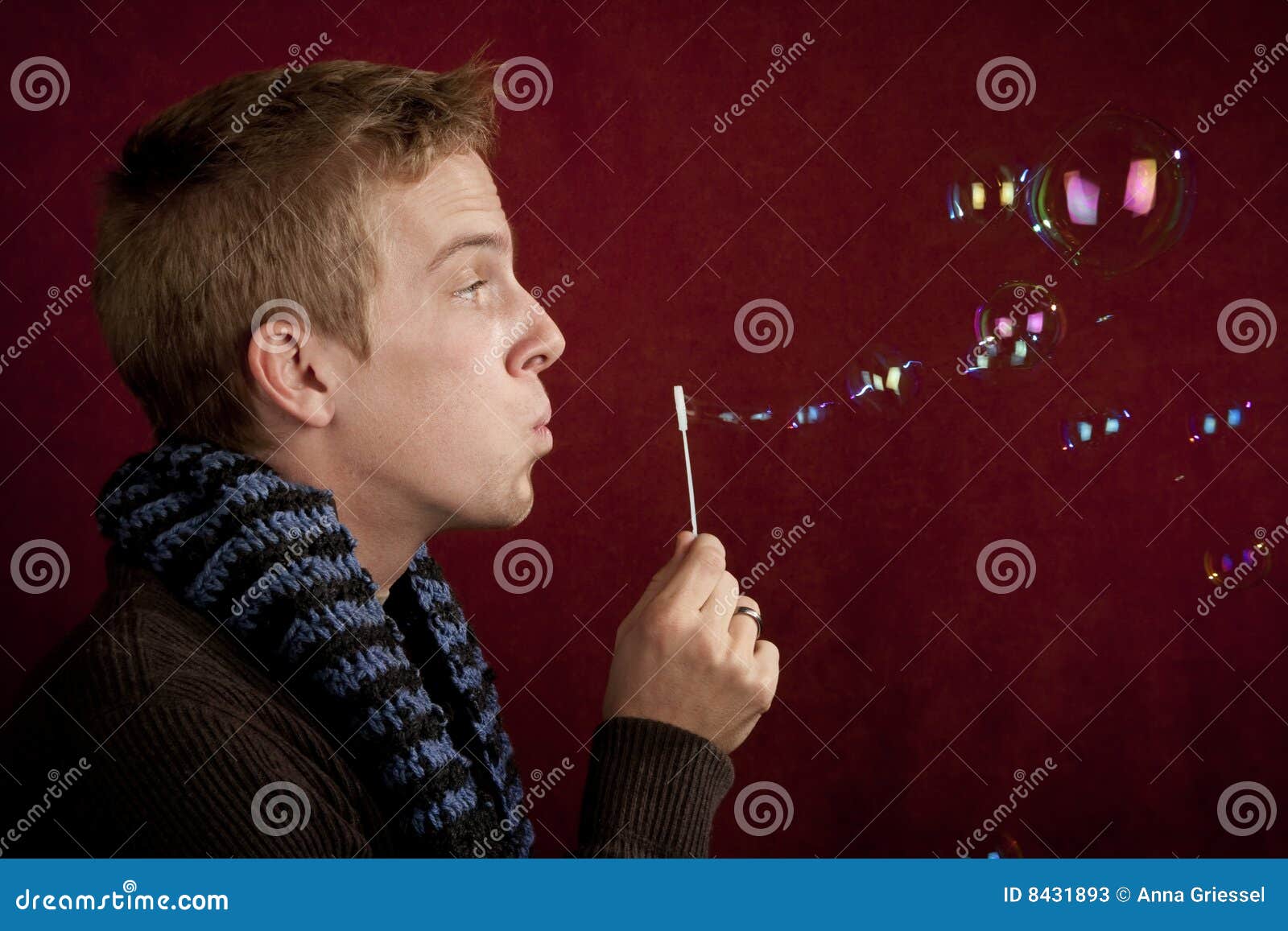 Young Man Blowing a Bubbles Stock Image - Image of male, playful: 8431893