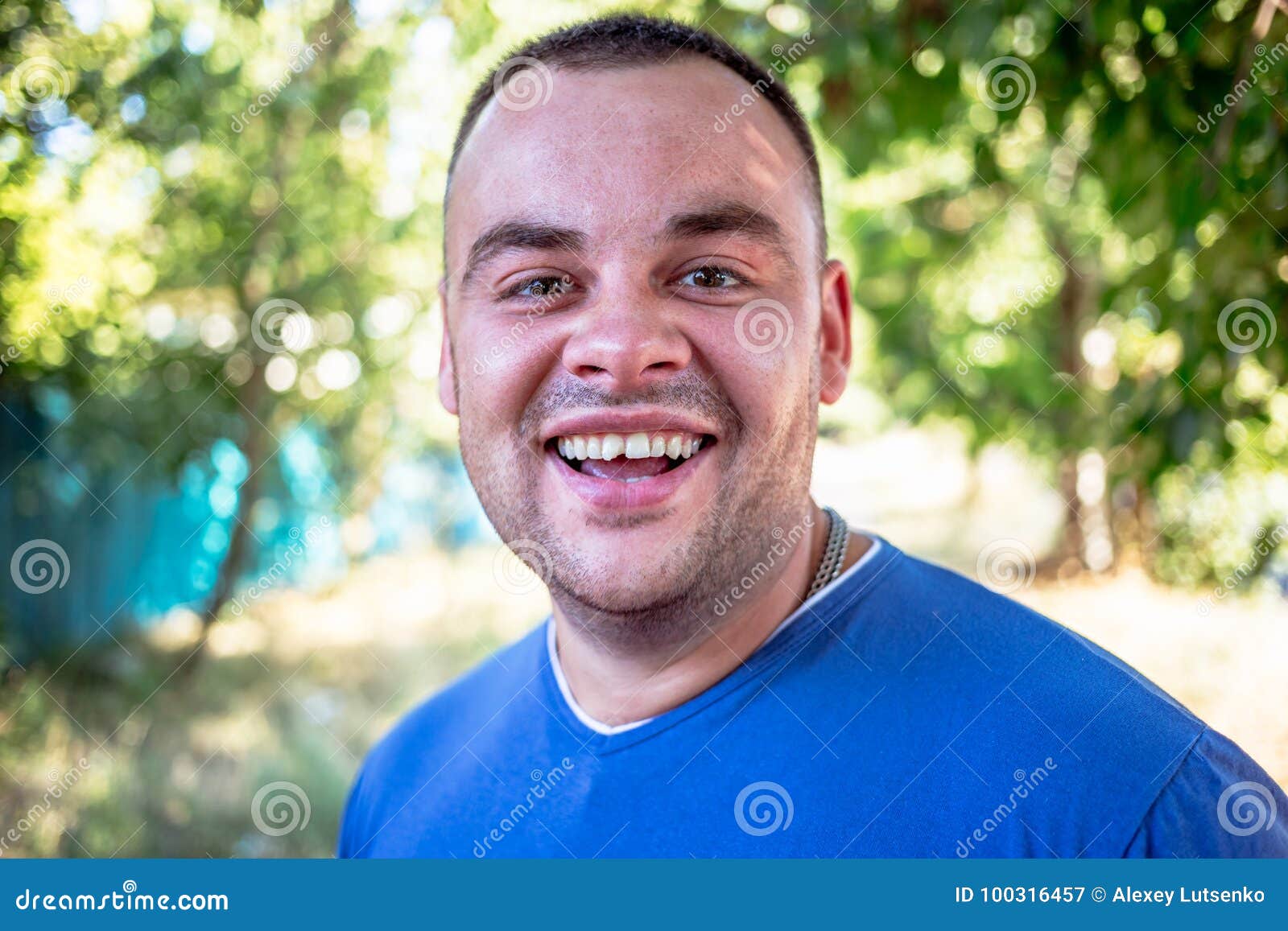 Young Man in a Blue T-shirt with a Chipped Tooth Stock Image - Image of ...