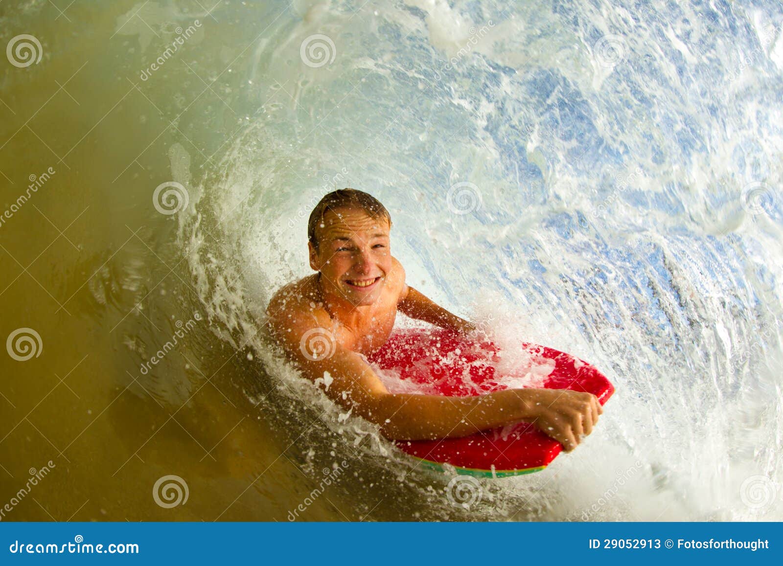 Young man body boarding stock image. Image of ocean, blue - 29052913