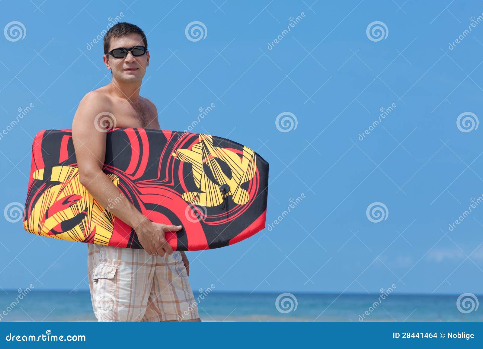 Young Man with Boogie Board Stock Photo - Image of ocean, handsome ...