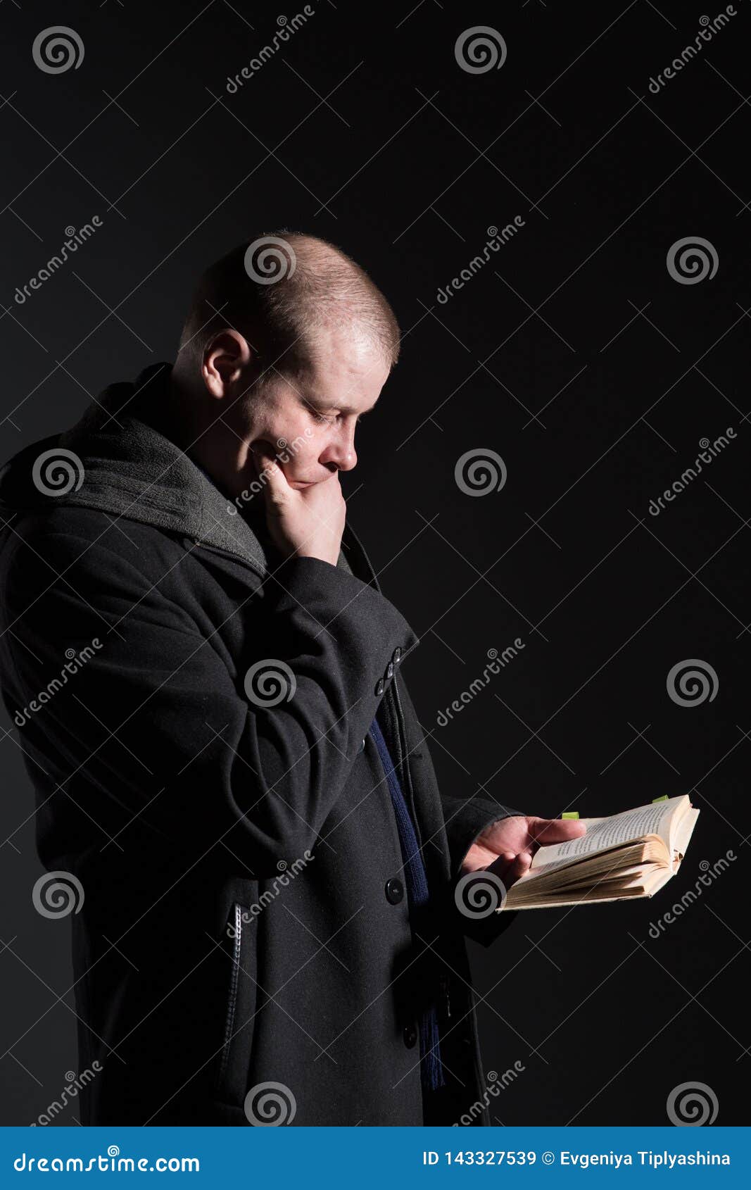 Young man with a book stock image. Image of caucasian - 143327539
