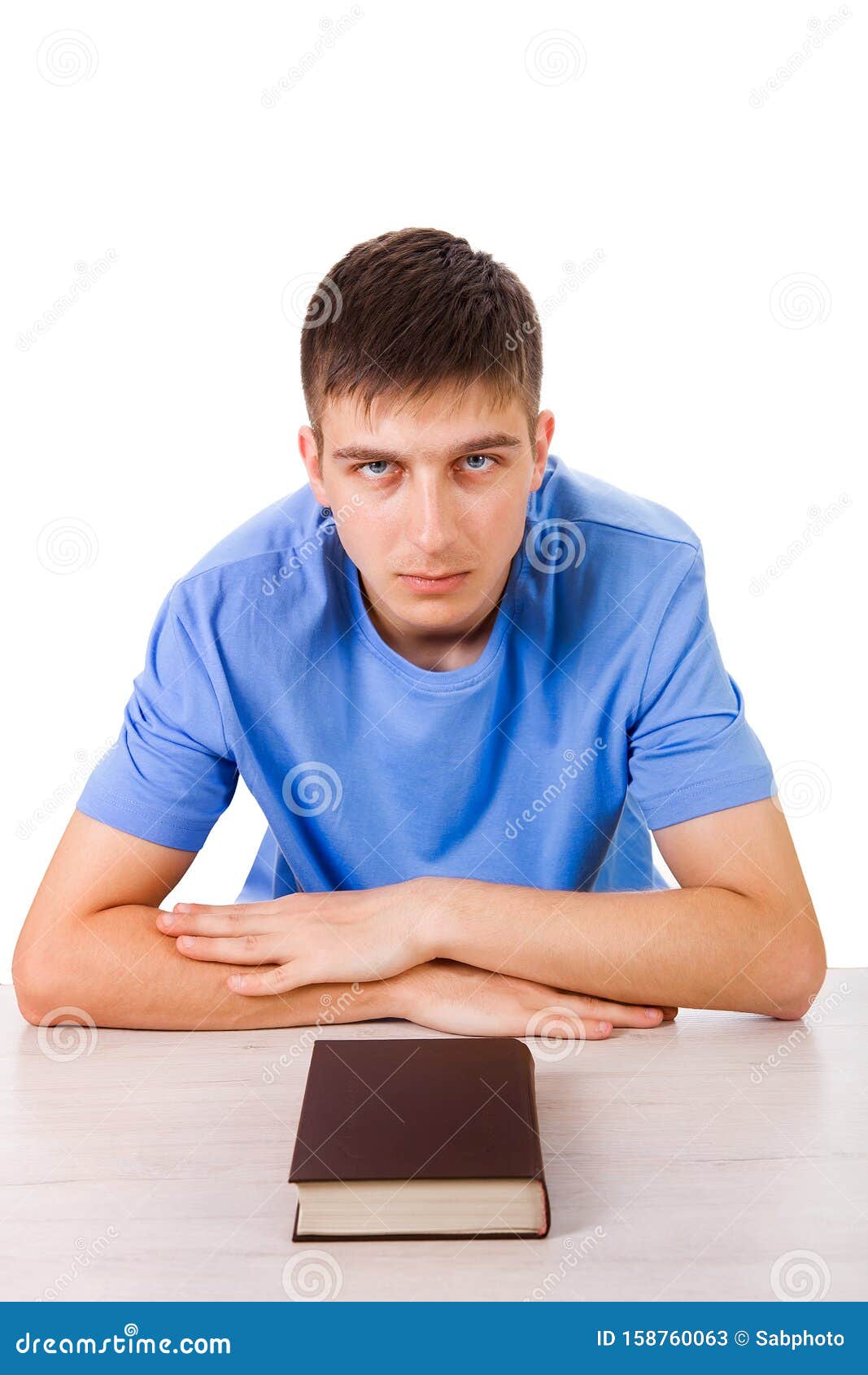 Young Man with a Book stock image. Image of schoolbook - 158760063