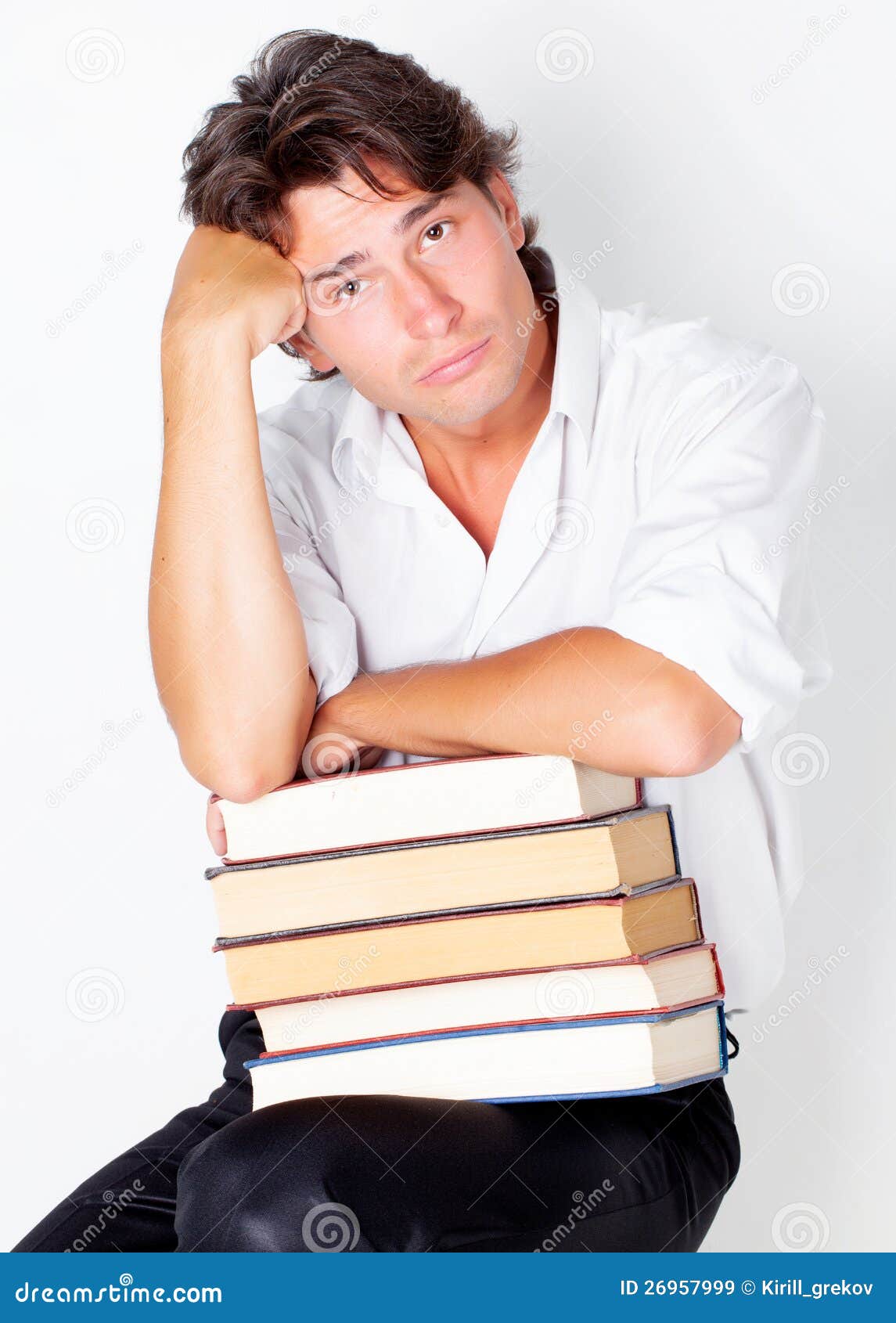 Young man with books stock image. Image of people, studio - 26957999