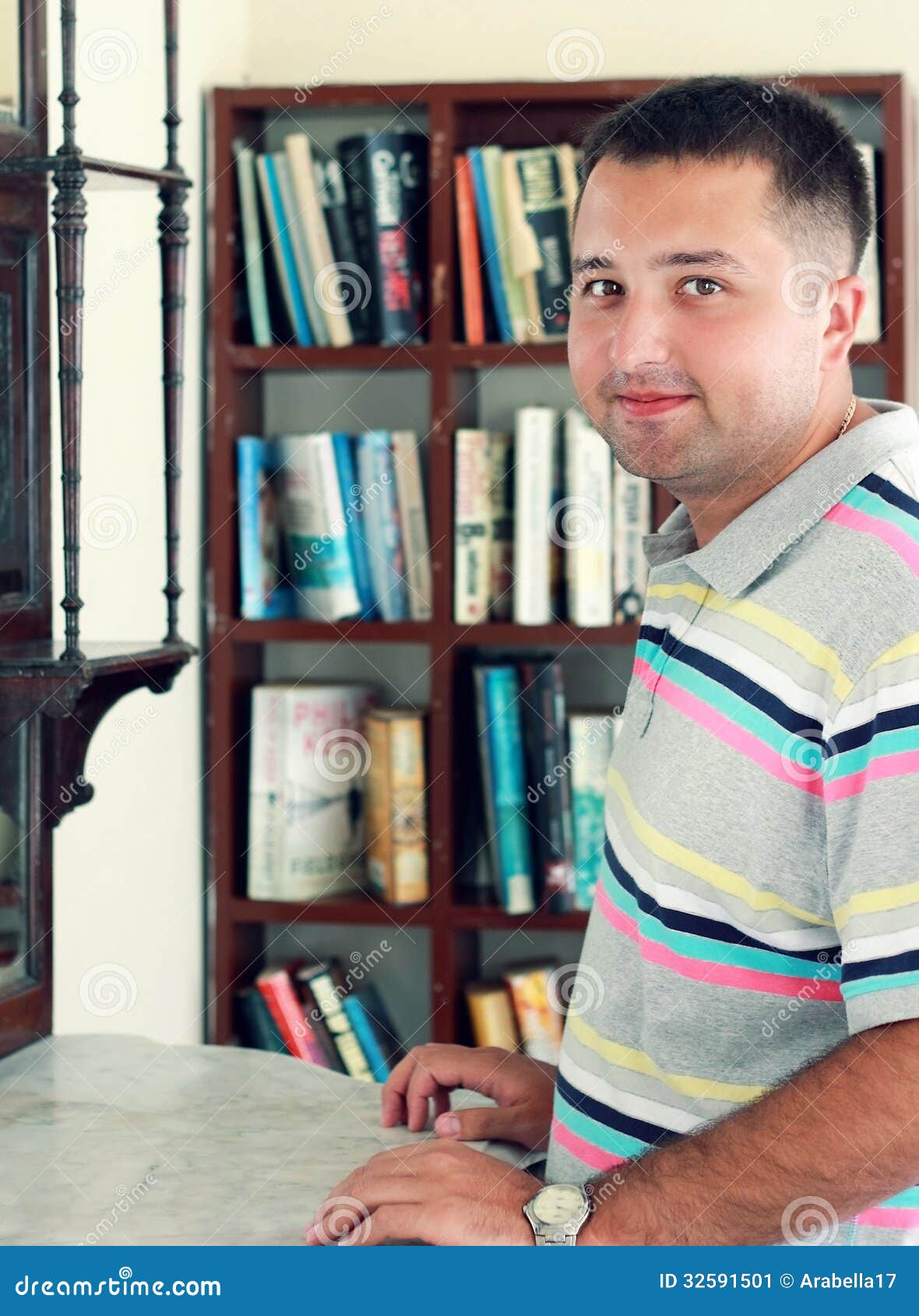 A young man with books stock image. Image of books, interest - 32591501