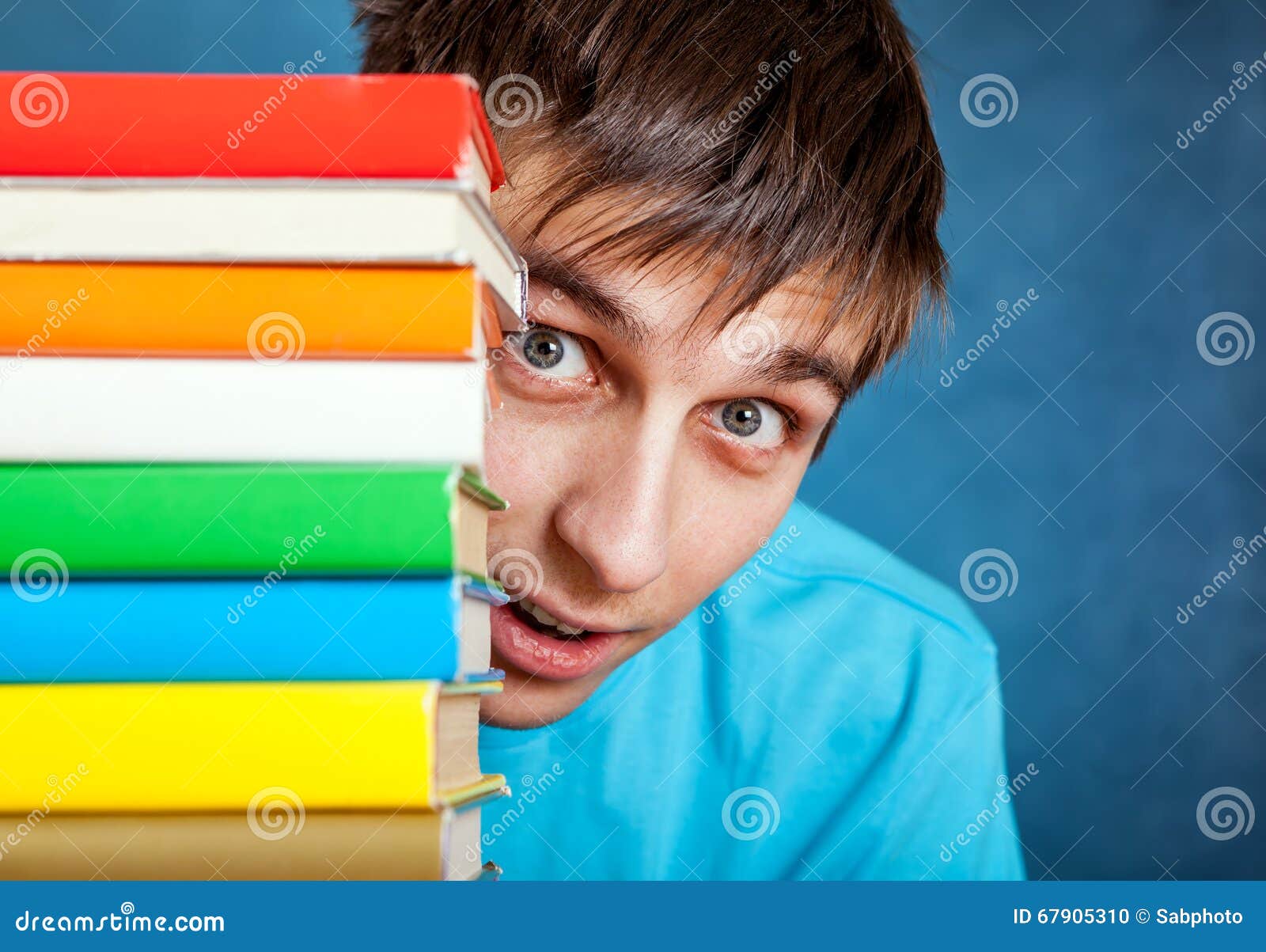 Young Man with the Books stock photo. Image of reader - 67905310