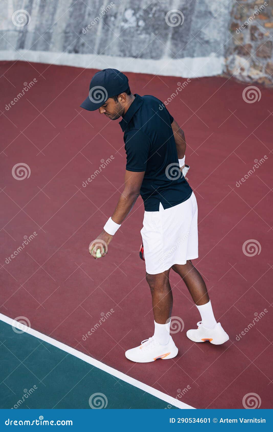 Young Man Bouncing the Ball at the Baseline Stock Image - Image of hard, concentration: 290534601