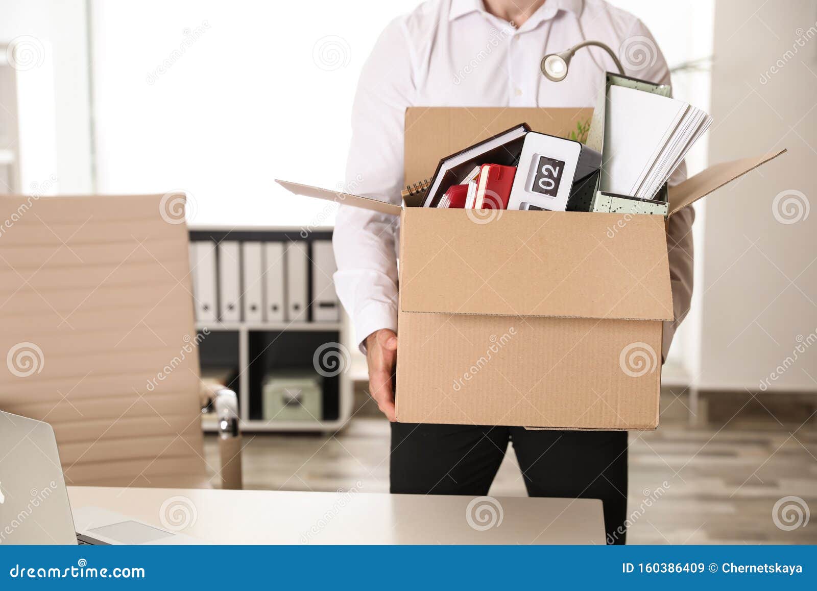Young Man with Box of Stuff in Office Stock Image - Image of company ...