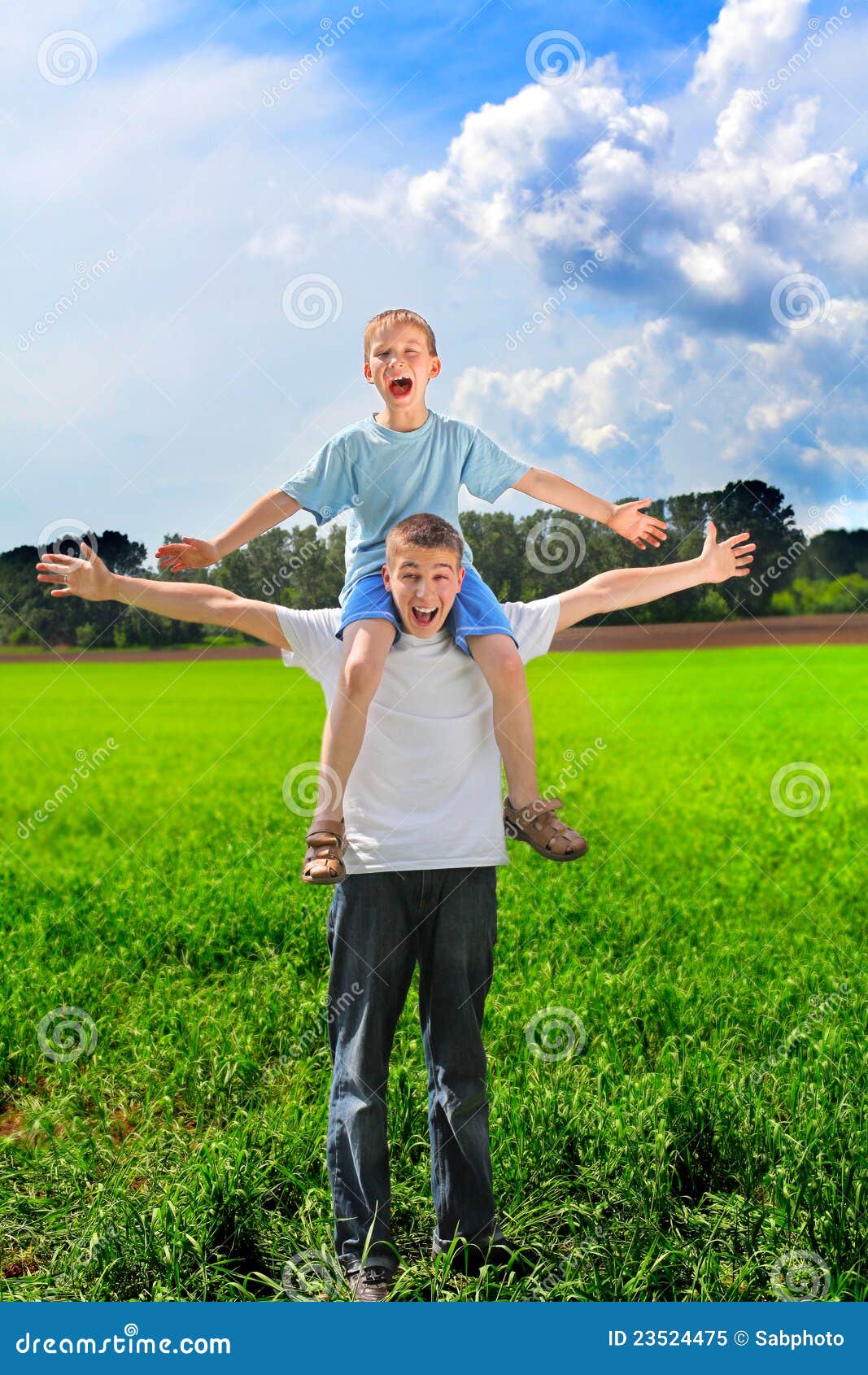 Young man and boy stock image. Image of friends, laughing - 23524475