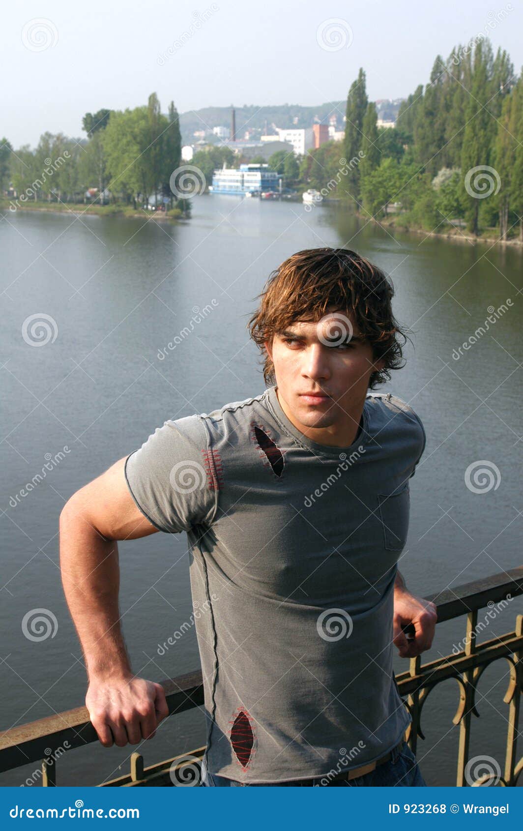 Young Man on the Bridge stock photo. Image of industrial - 923268