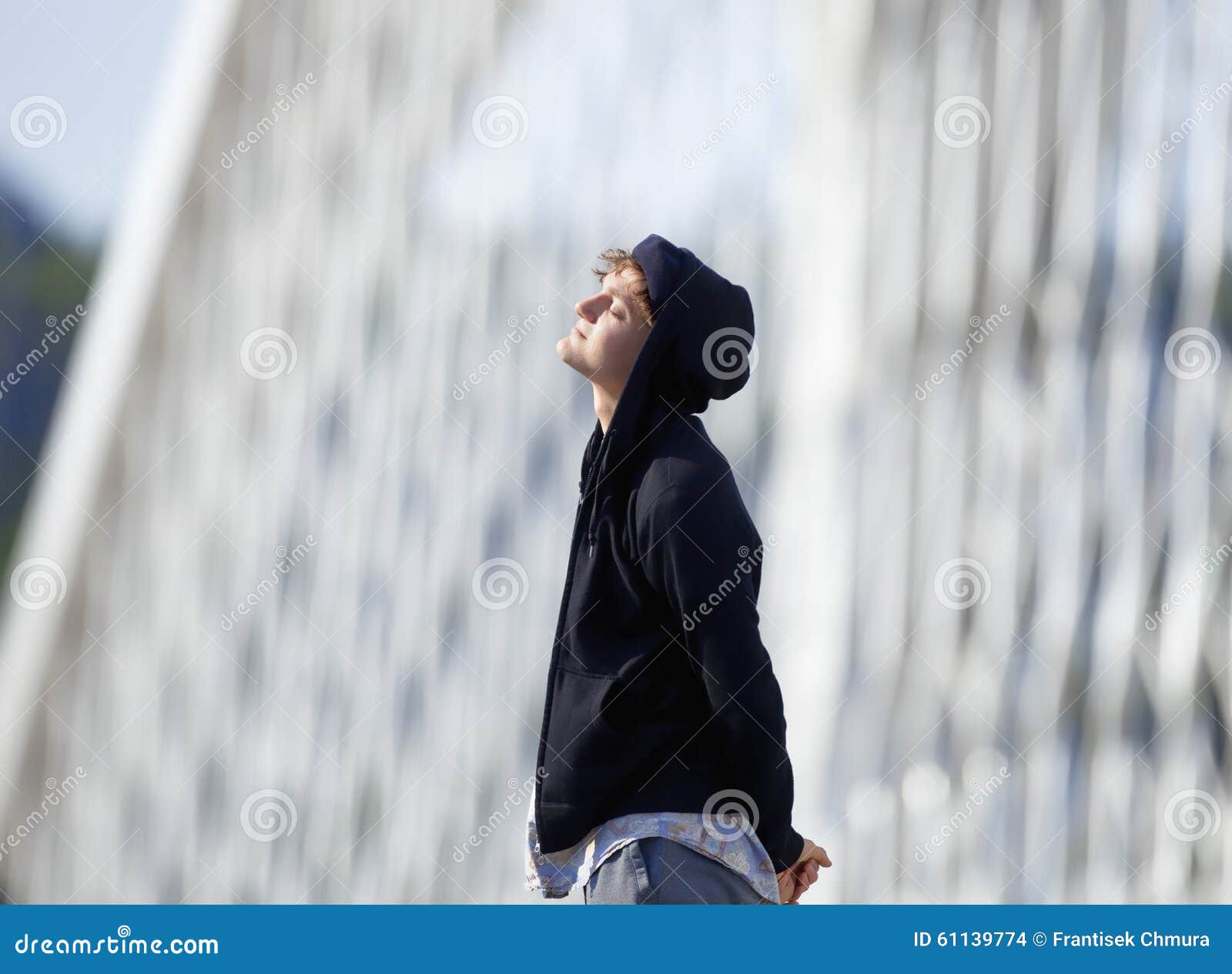 Young Man on the Bridge stock photo. Image of standing - 61139774