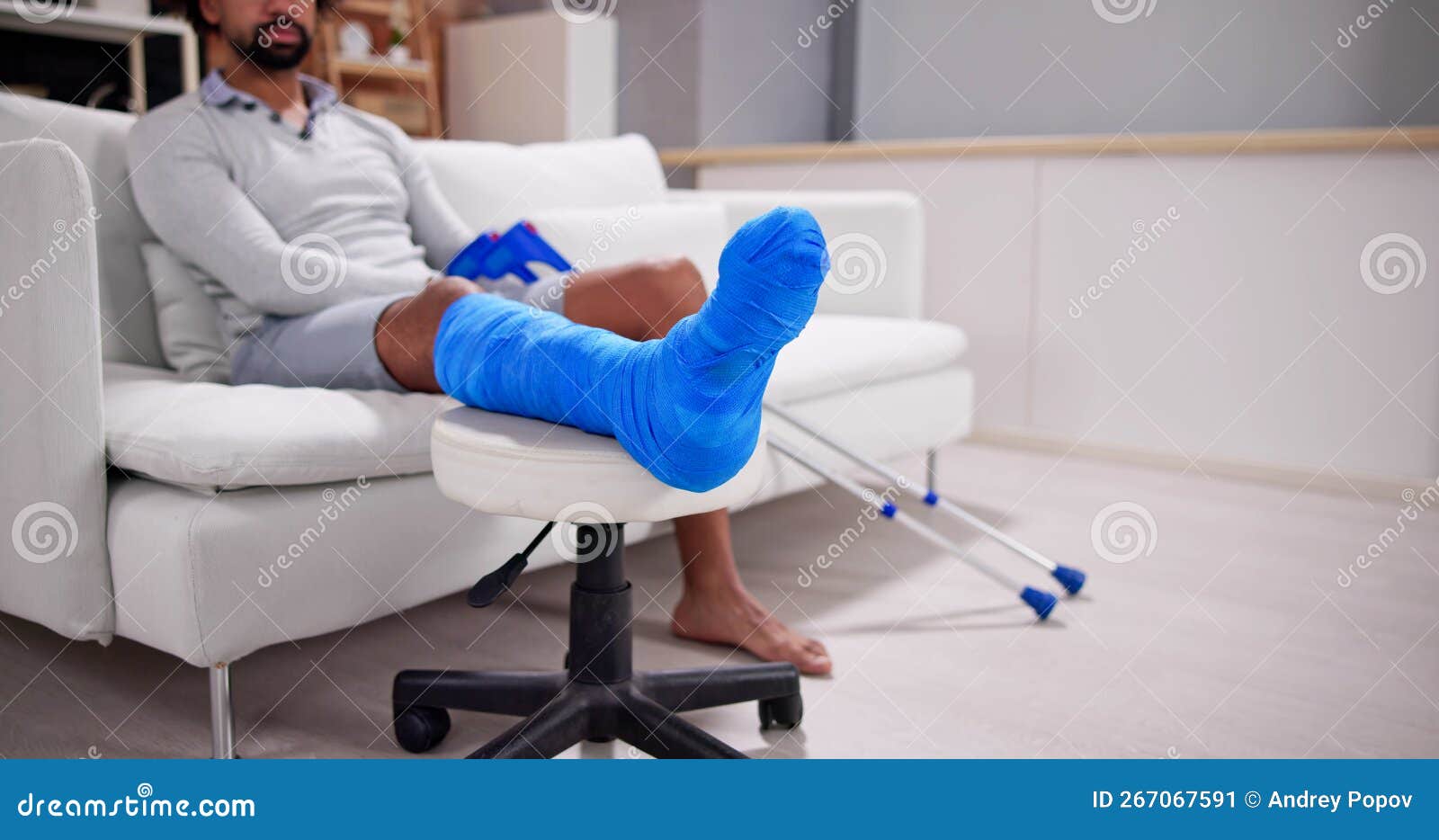Young Man with Broken Leg Sitting Stock Image - Image of american ...