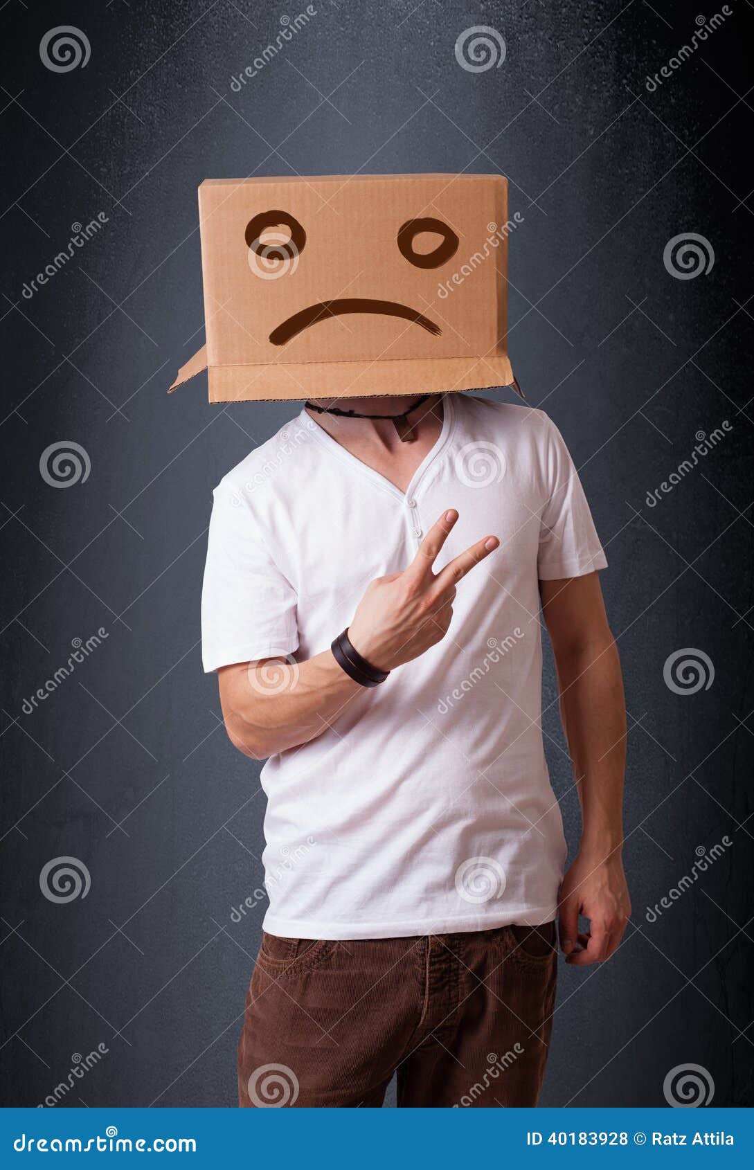 Young Man with a Brown Cardboard Box on His Head with Sad Face Stock ...