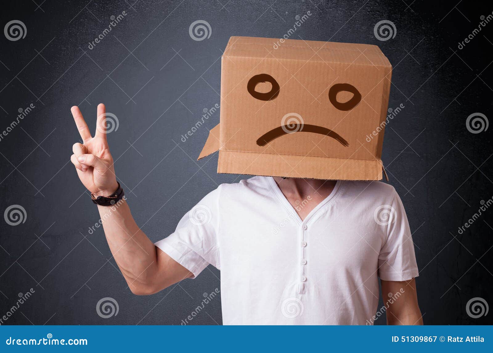 Young Man with a Brown Cardboard Box on His Head with Sad Face Stock ...