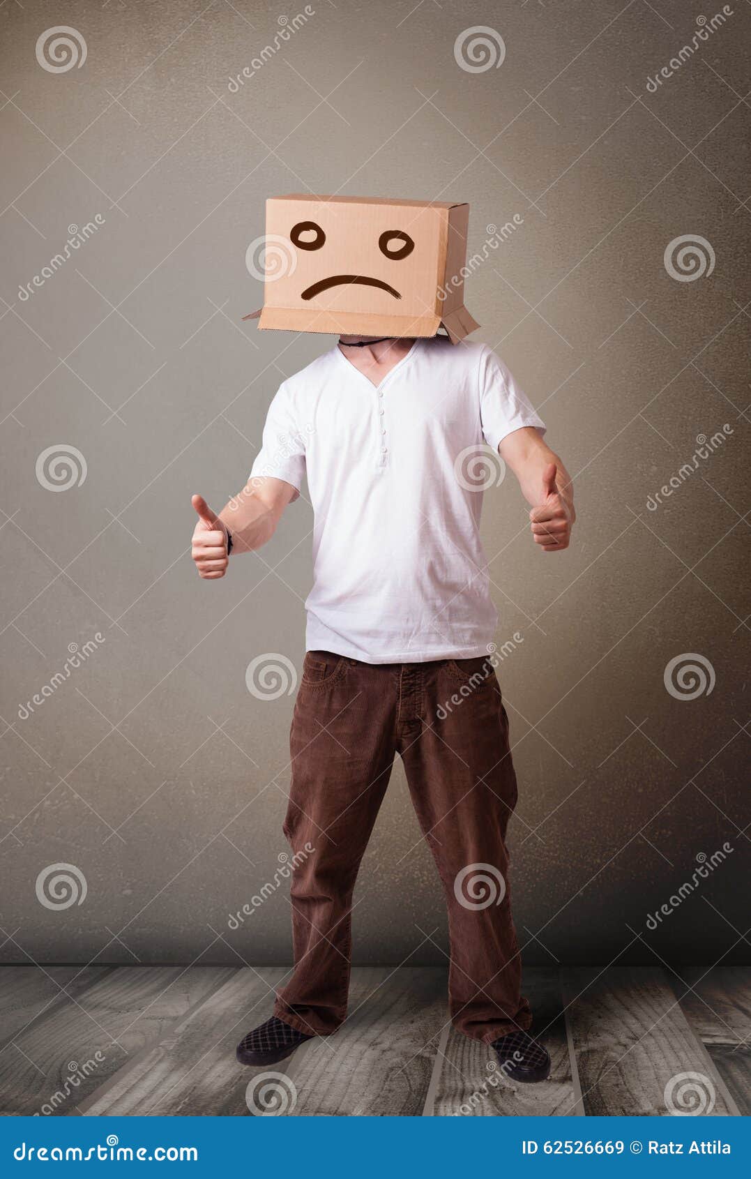 Young Man with a Brown Cardboard Box on His Head with Sad Face Stock ...