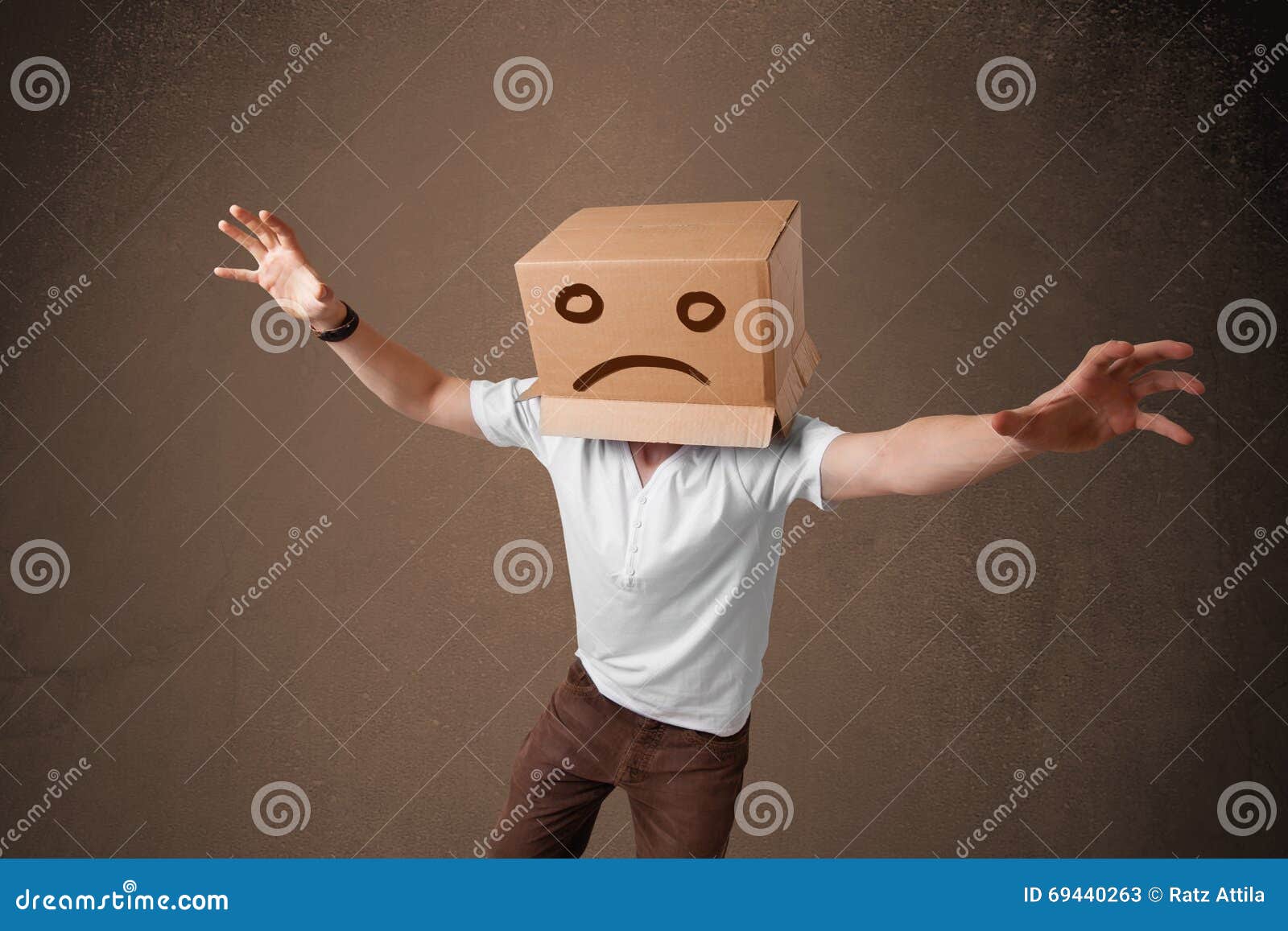 Young Man with a Brown Cardboard Box on His Head with Sad Face Stock ...