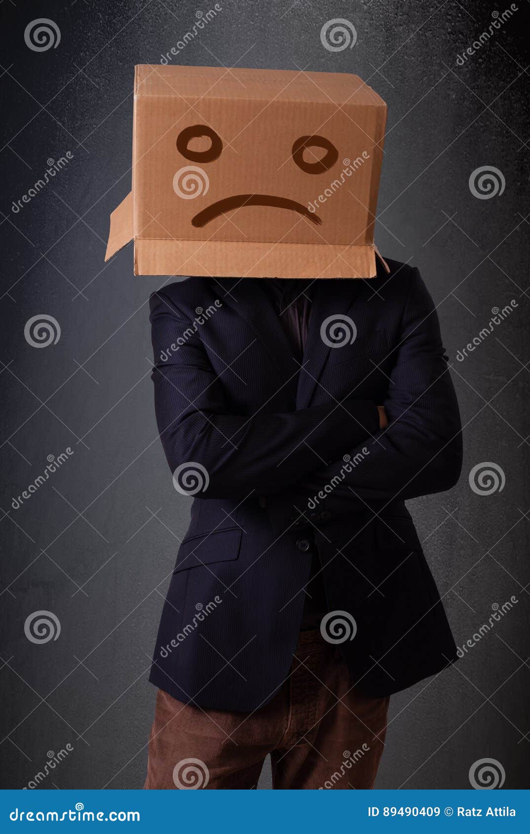 Young Man with a Brown Cardboard Box on His Head with Sad Face Stock ...
