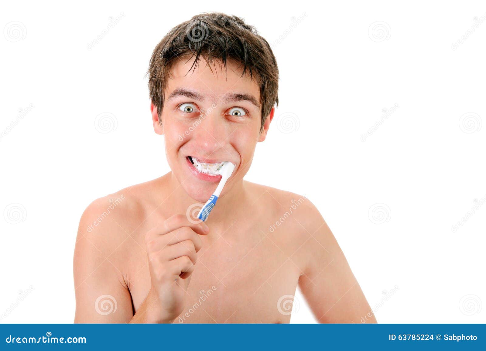 Young Man Brushing His Teeth Stock Photo - Image of isolated, joyful ...