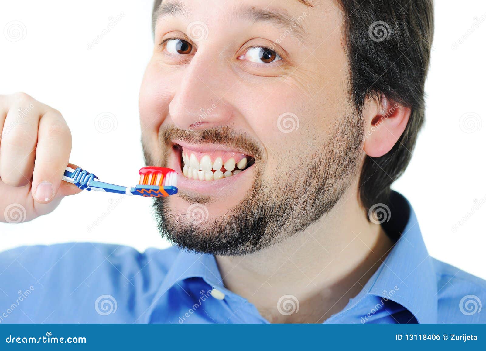 Young man brushing teeth stock photo. Image of closeup - 13118406