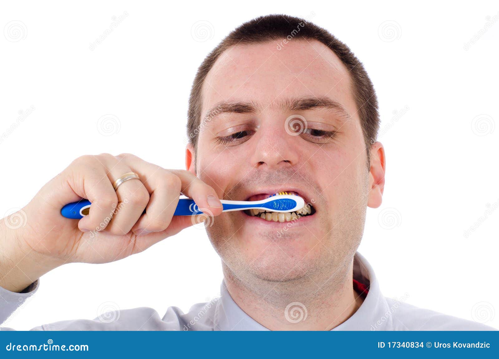 Young man Brushing teeth stock photo. Image of brush - 17340834