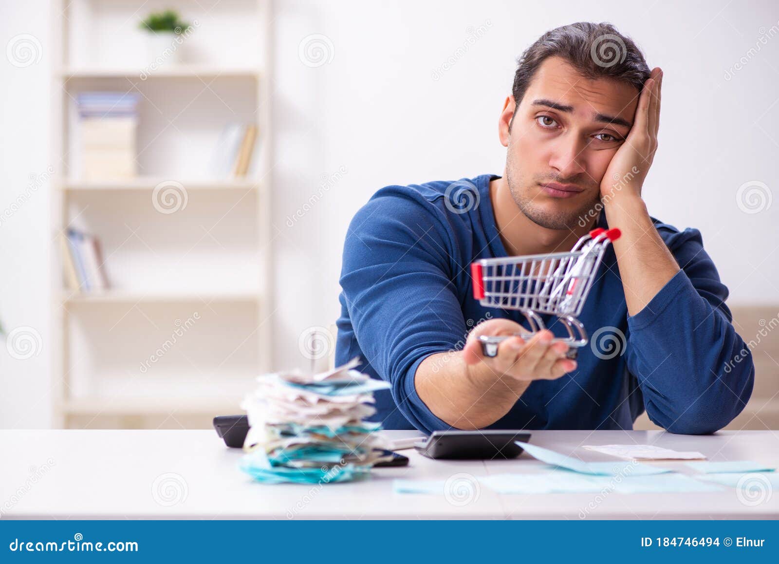 Young Man in Budget Planning Concept Stock Photo - Image of cart ...