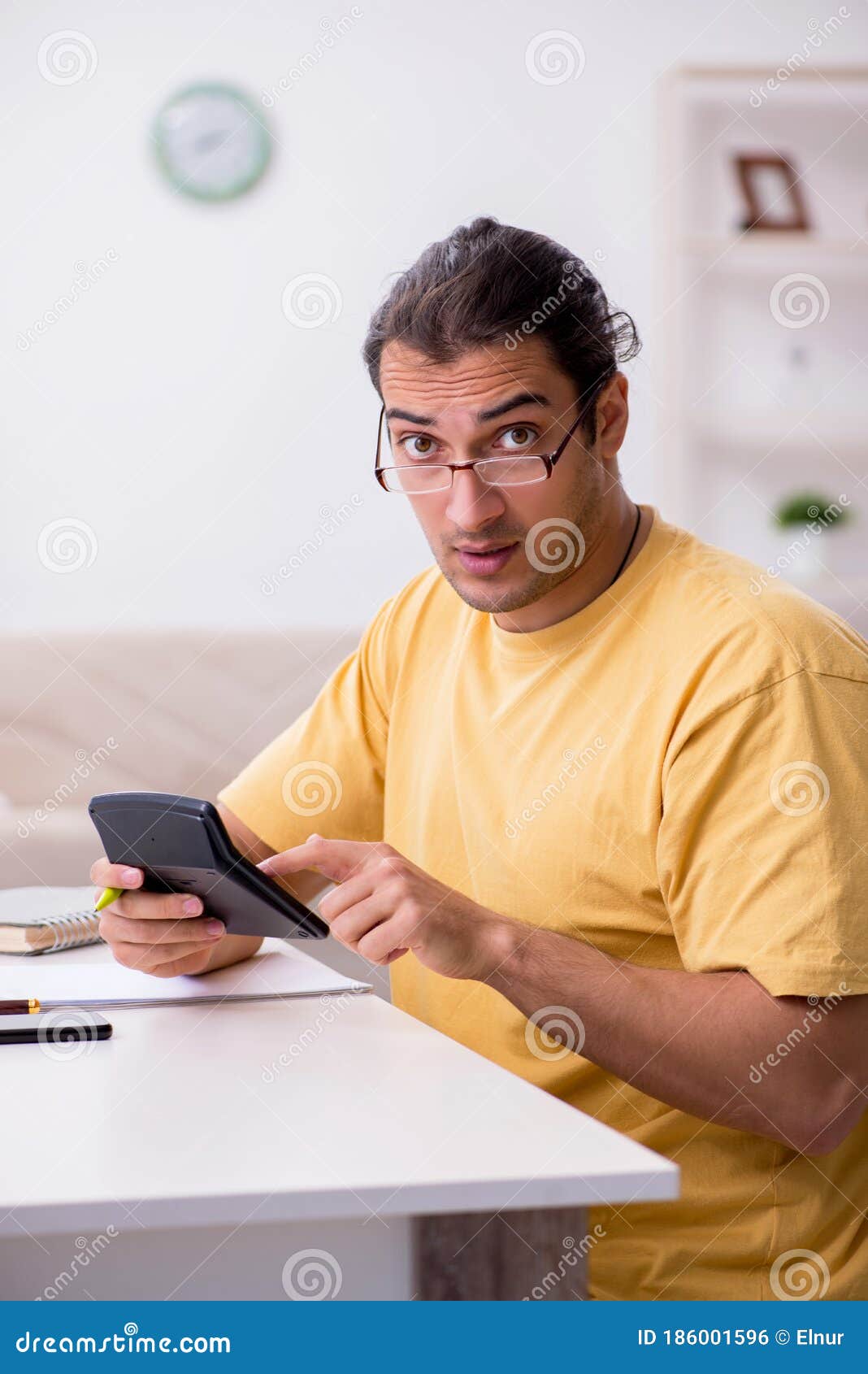 Young Man in Budget Planning Concept Stock Photo - Image of economy ...