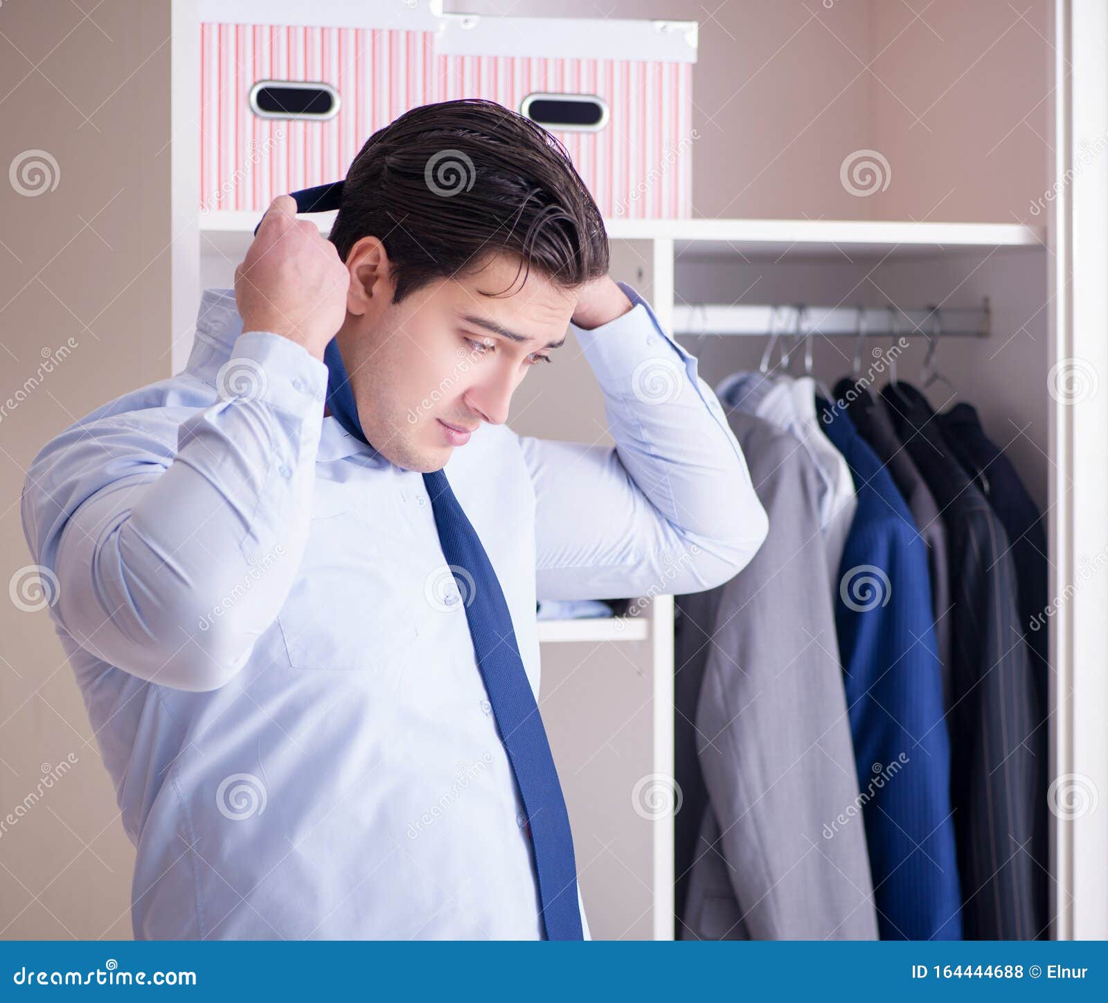Young Man Businessman Getting Dressed for Work Stock Photo - Image of ...