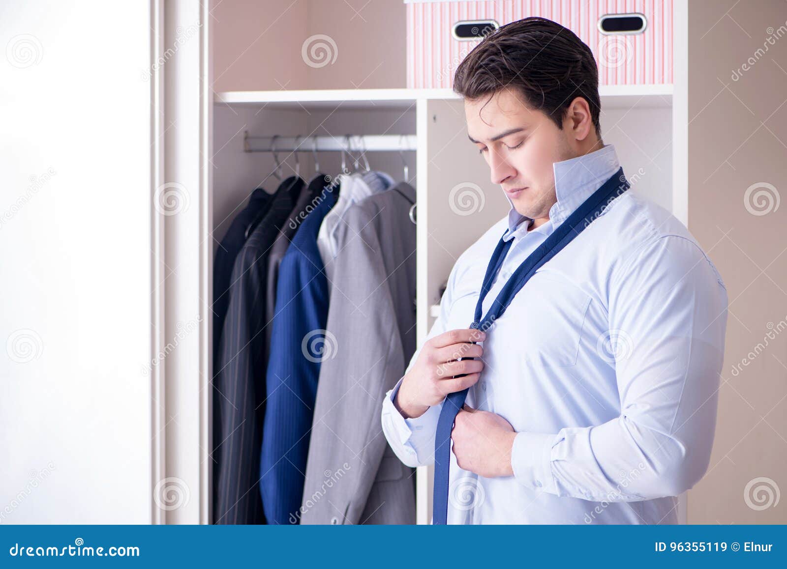 The Young Man Businessman Getting Dressed for Work Stock Image - Image ...