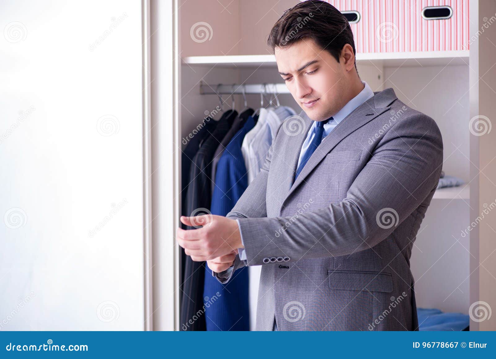 The Young Man Businessman Getting Dressed for Work Stock Image - Image ...