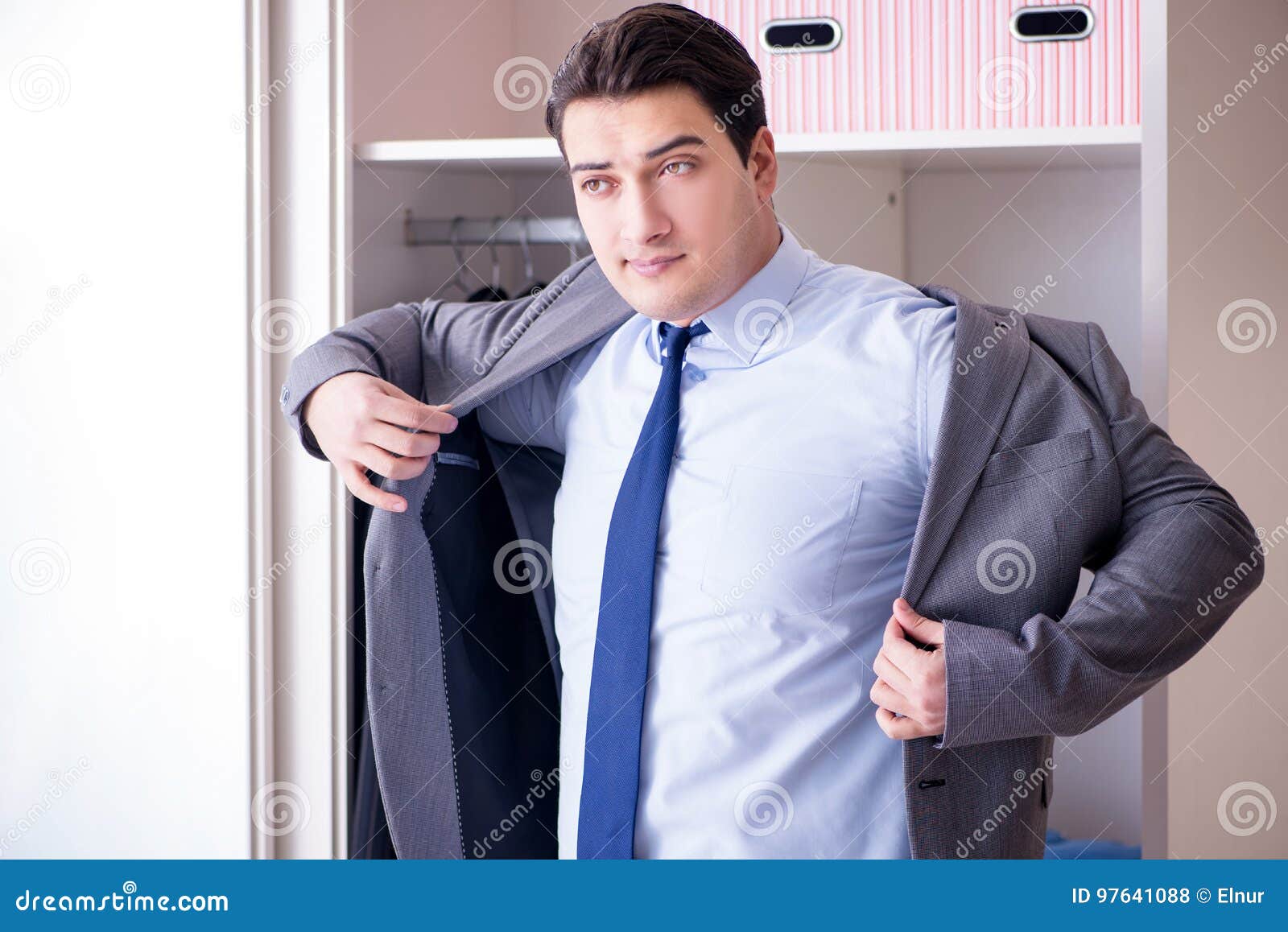 The Young Man Businessman Getting Dressed for Work Stock Photo - Image ...